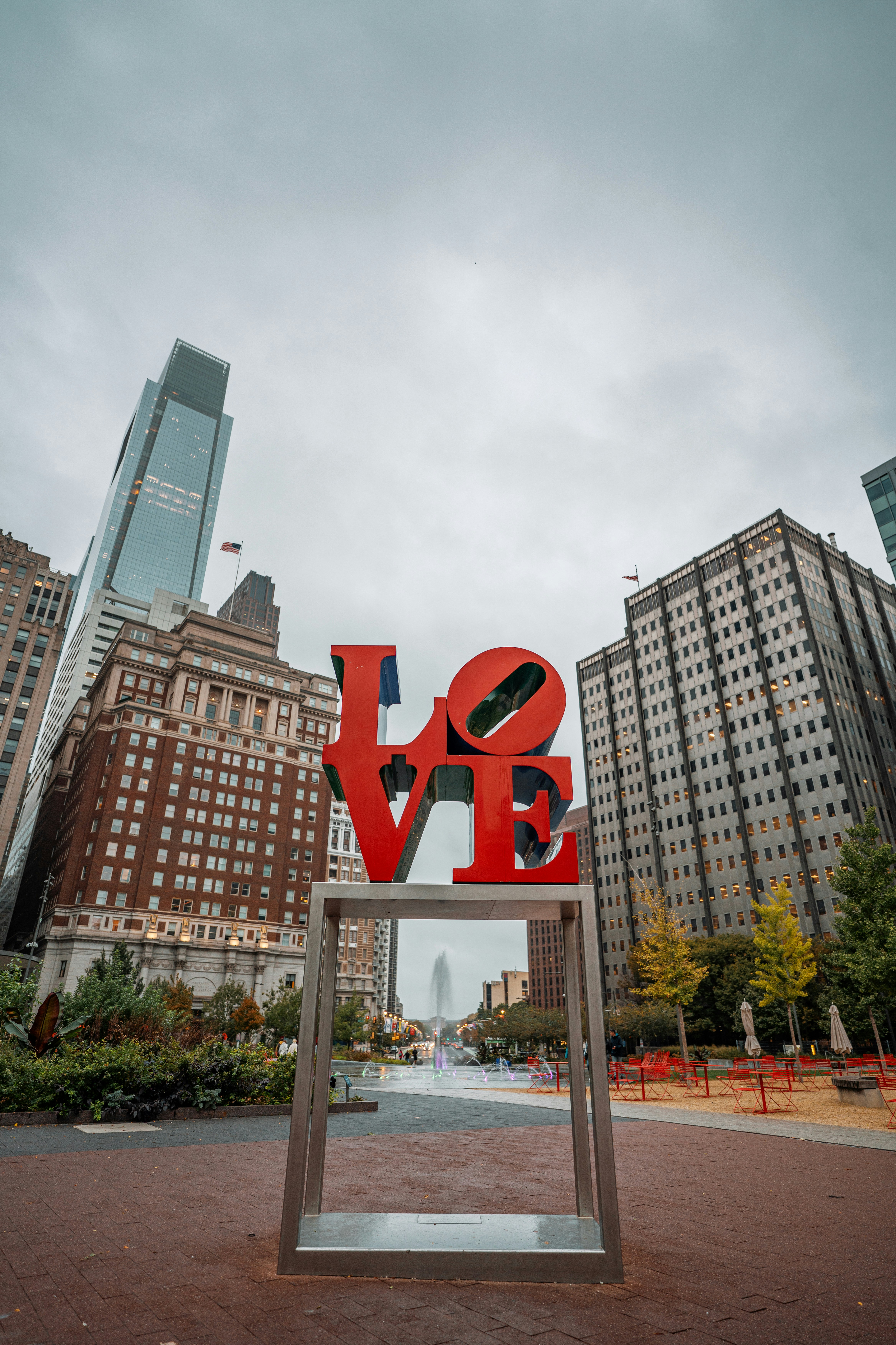 Love in the City: Red Sculptures Framing Skyscrapers