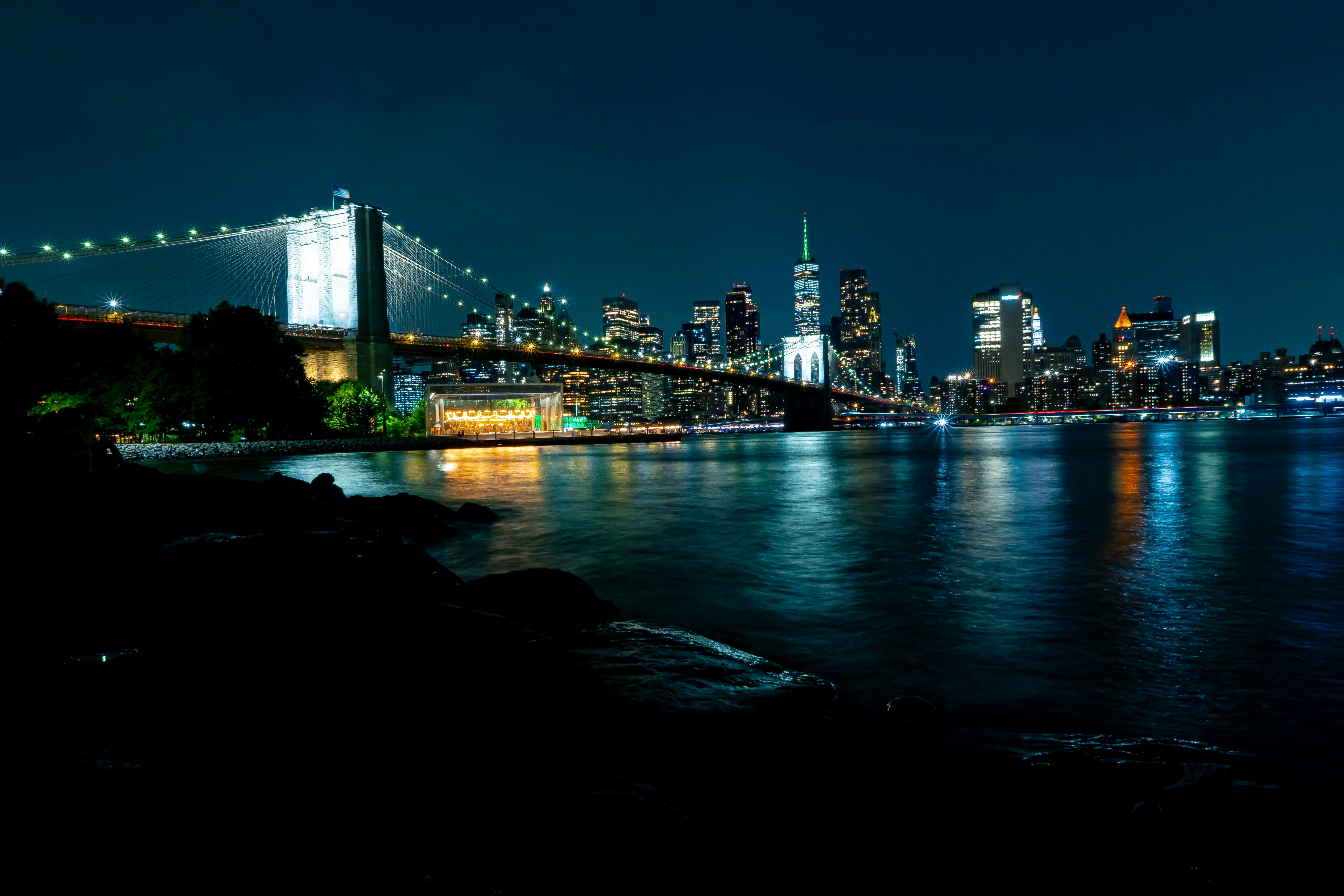 Twin River Mirage: Night Lights on the Brooklyn Skyline