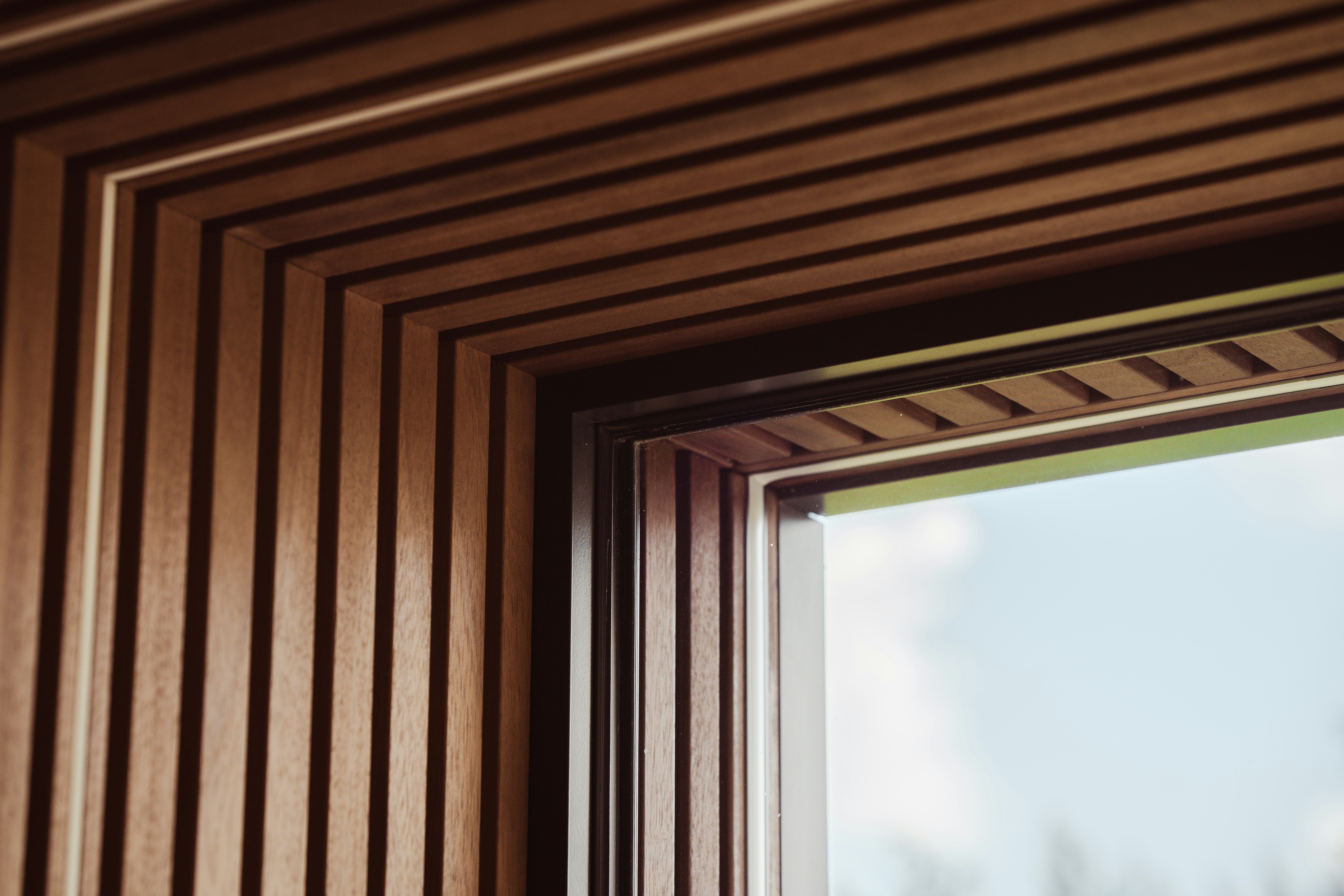 Framed Geometry: Wood Ridges Leading to an Open Sky