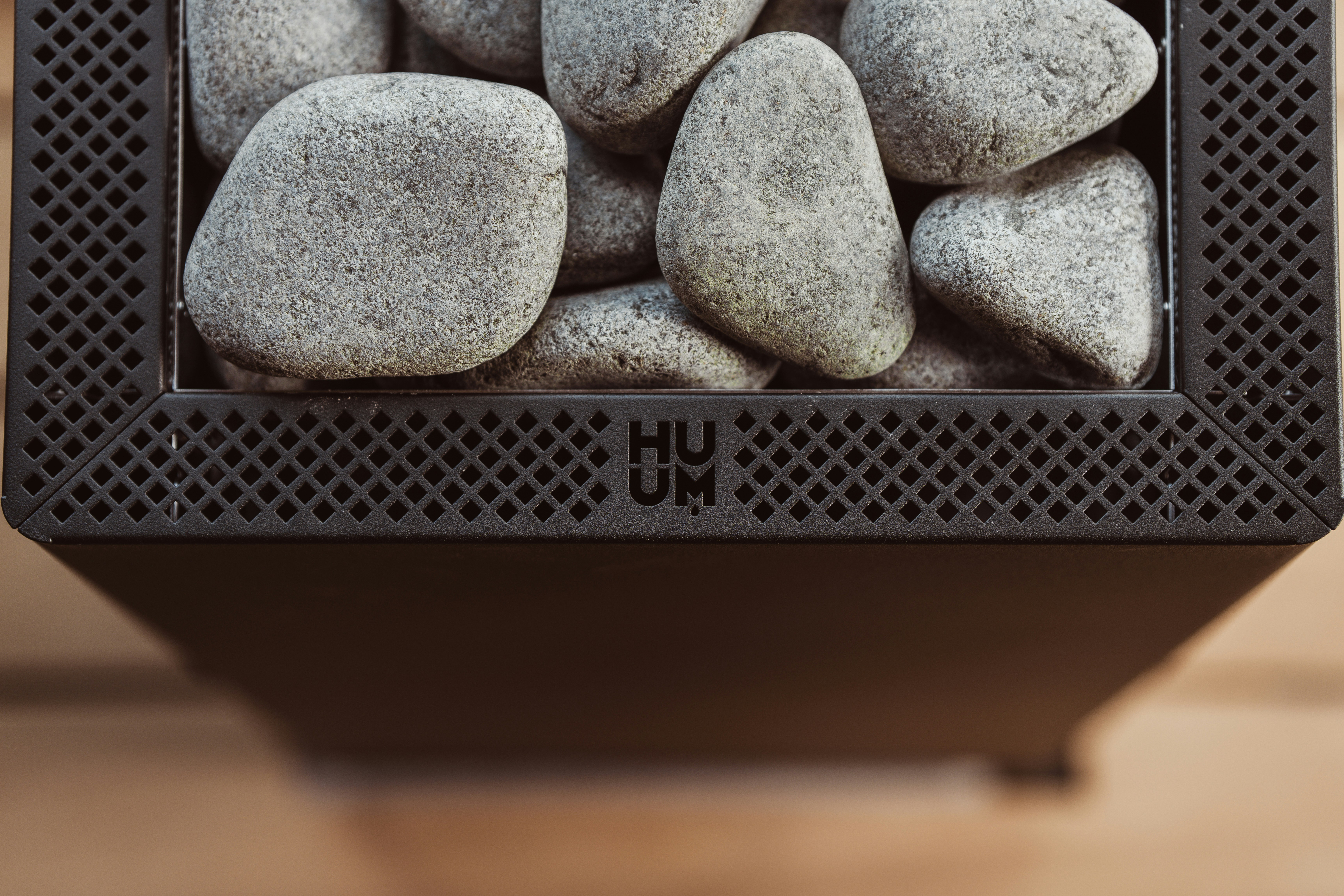 Stone Vessel: A Close-Up of Rock-Filled Ember Grill