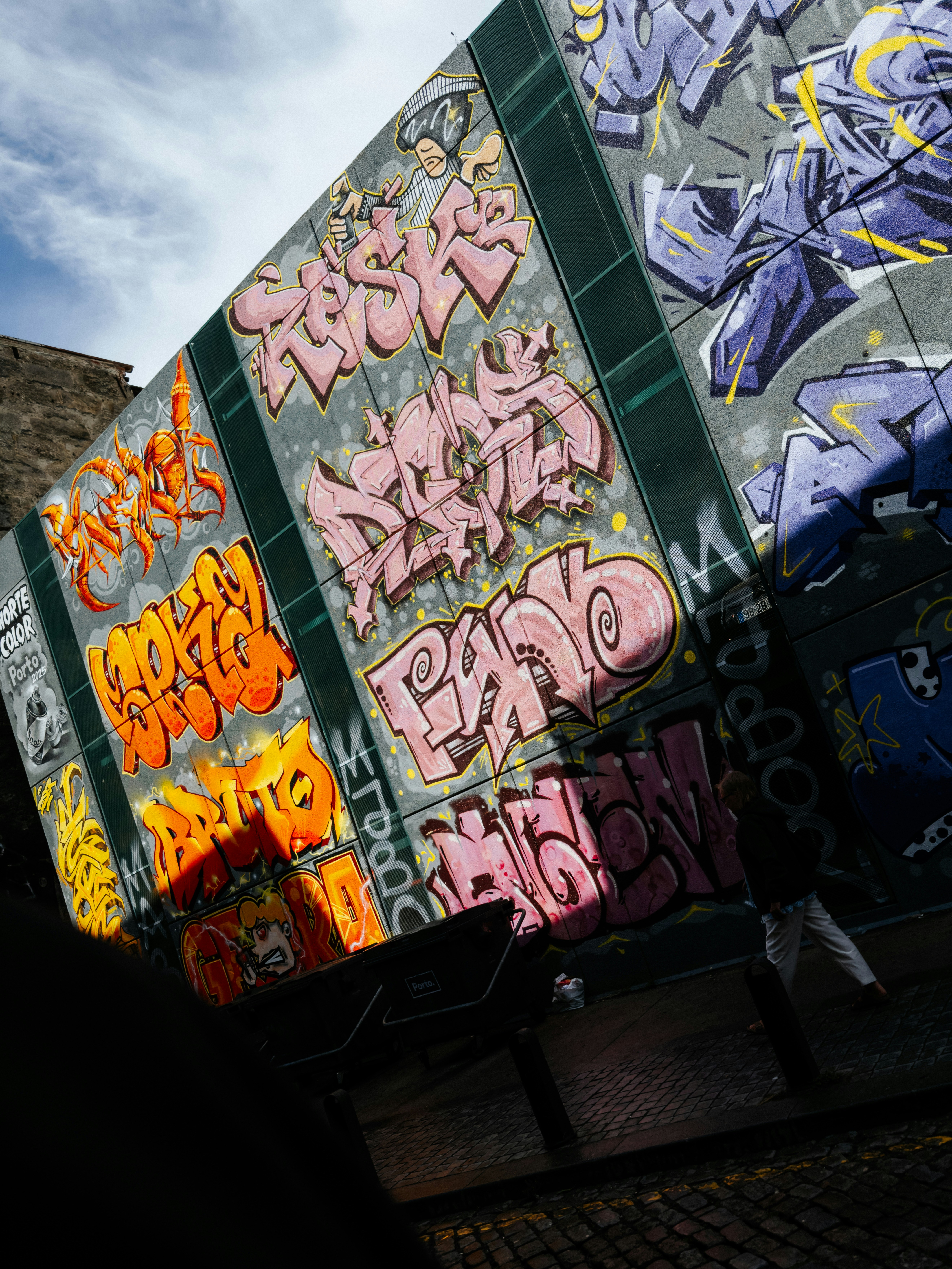 Graffiti Cathedral: Angled Panels of Neon Letters