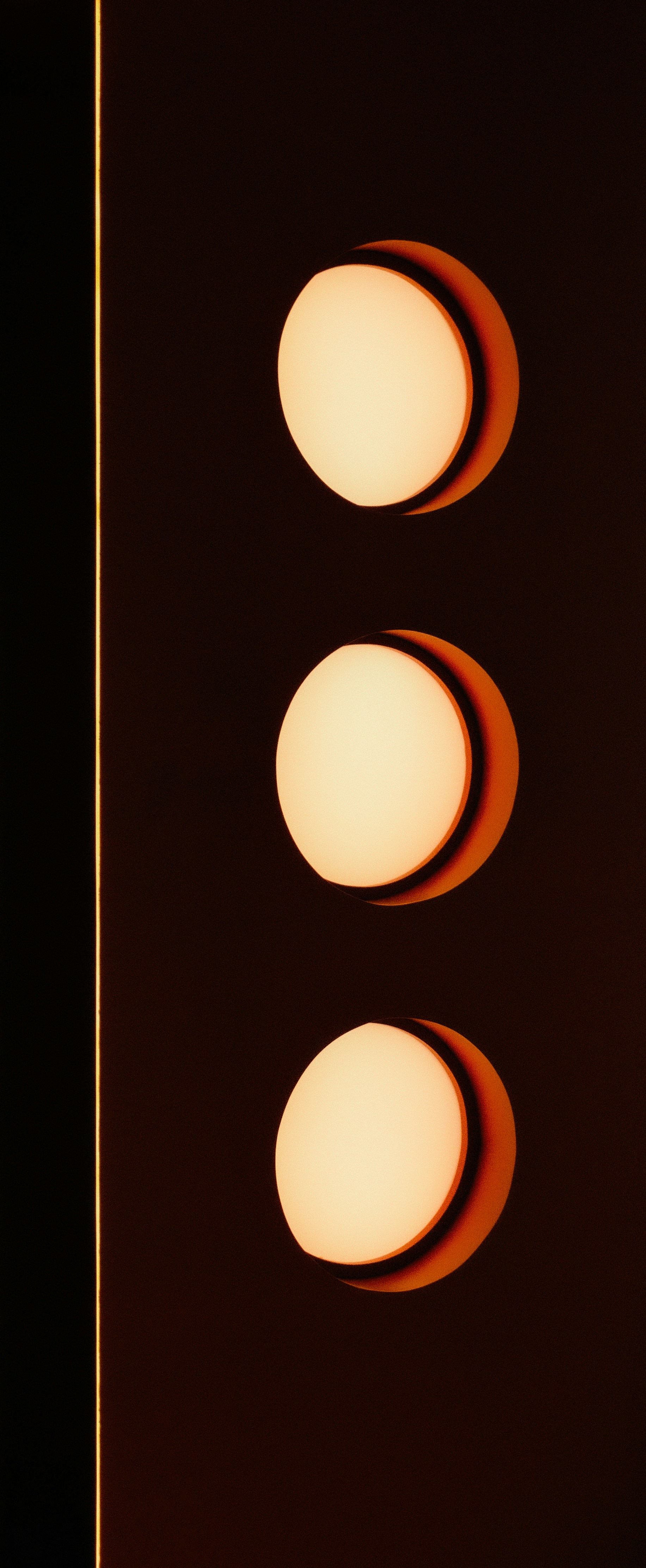 Orange Orbs in a Narrow Corridor