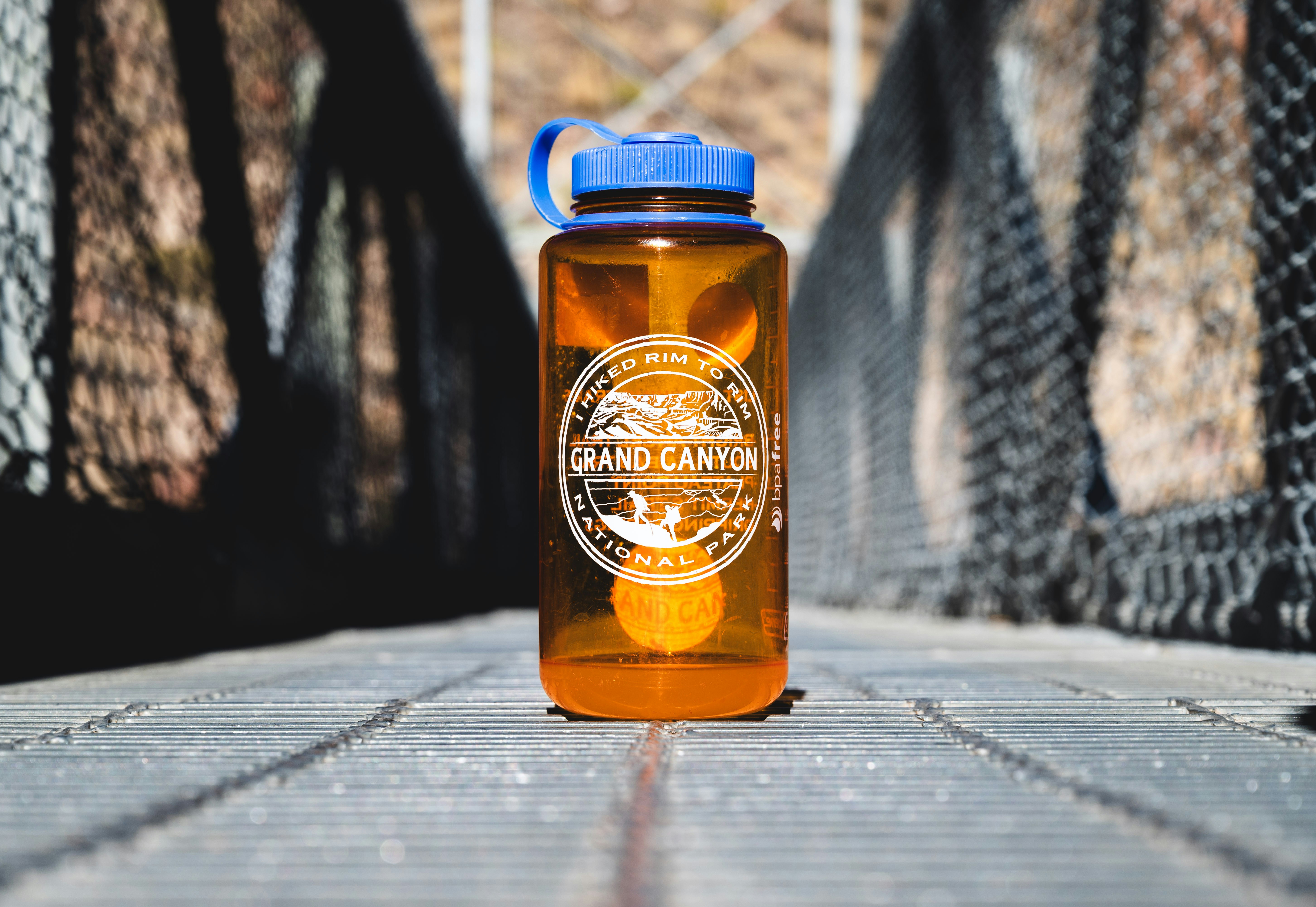 Amber Drop on a Bridge: A Solo Bottle in Sharp Focus