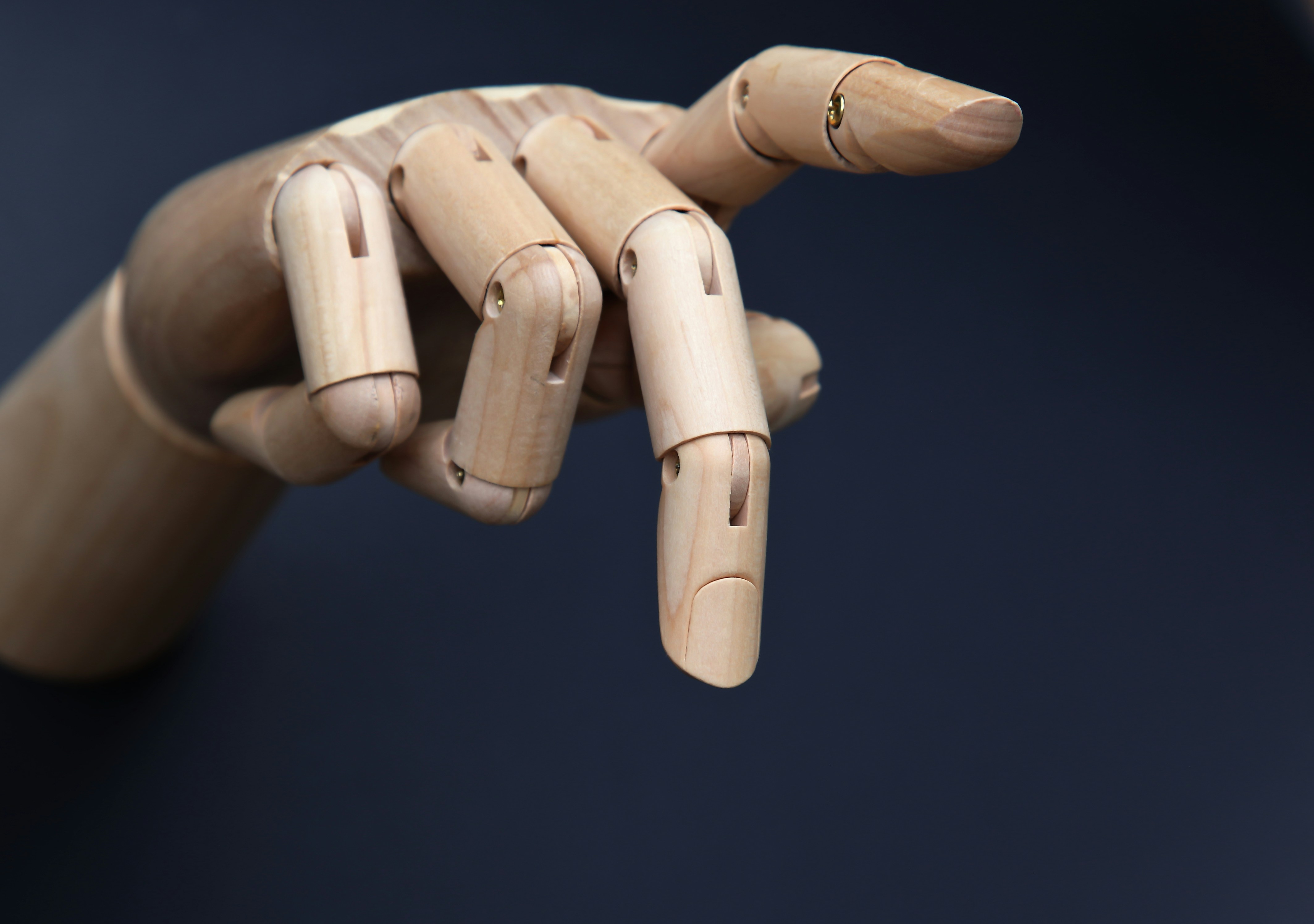 Gesture of Craft: A Wooden Hand Reaching into the Void