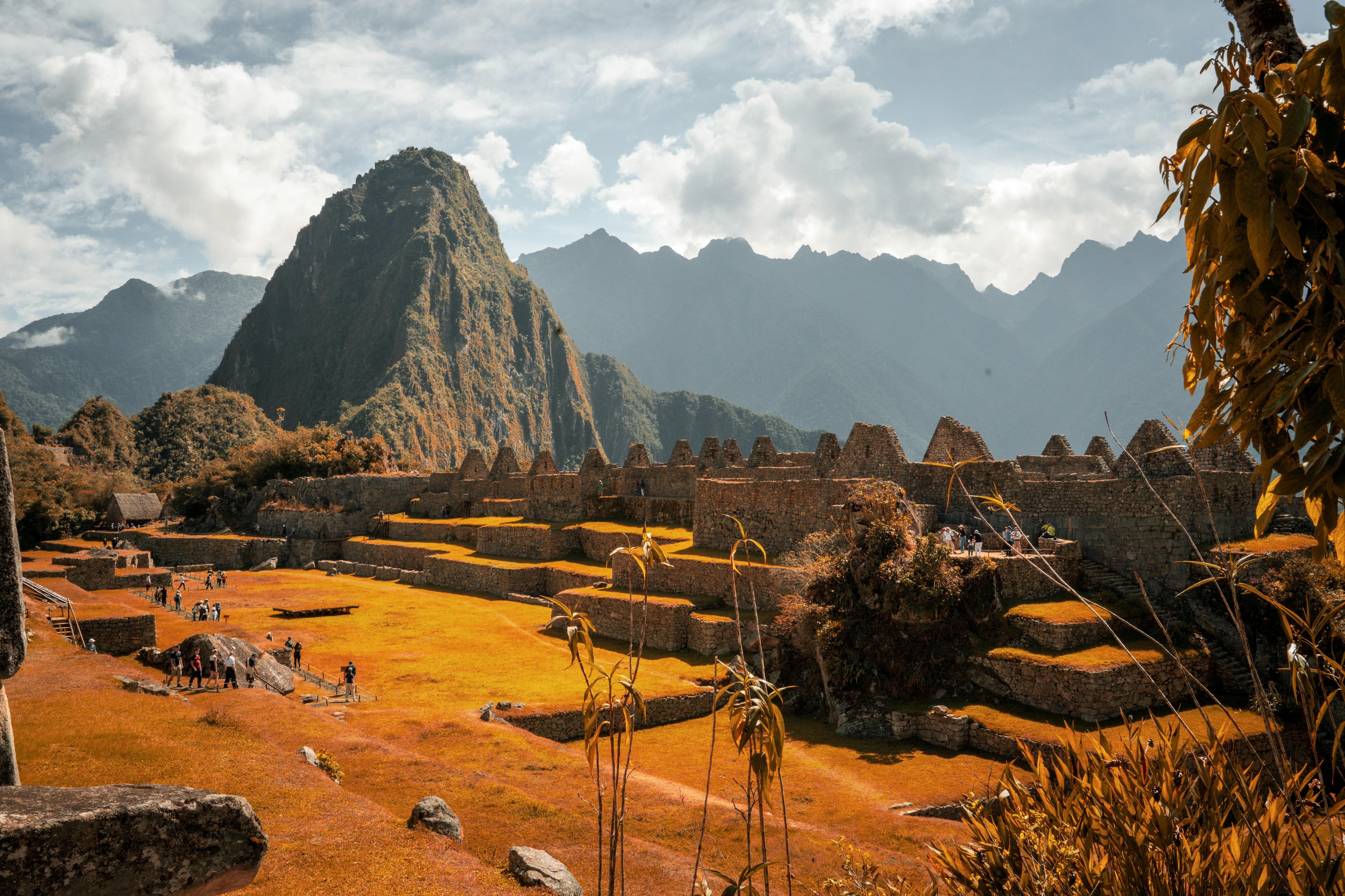 Terraced Sunlit Stones Under Andean Peaks