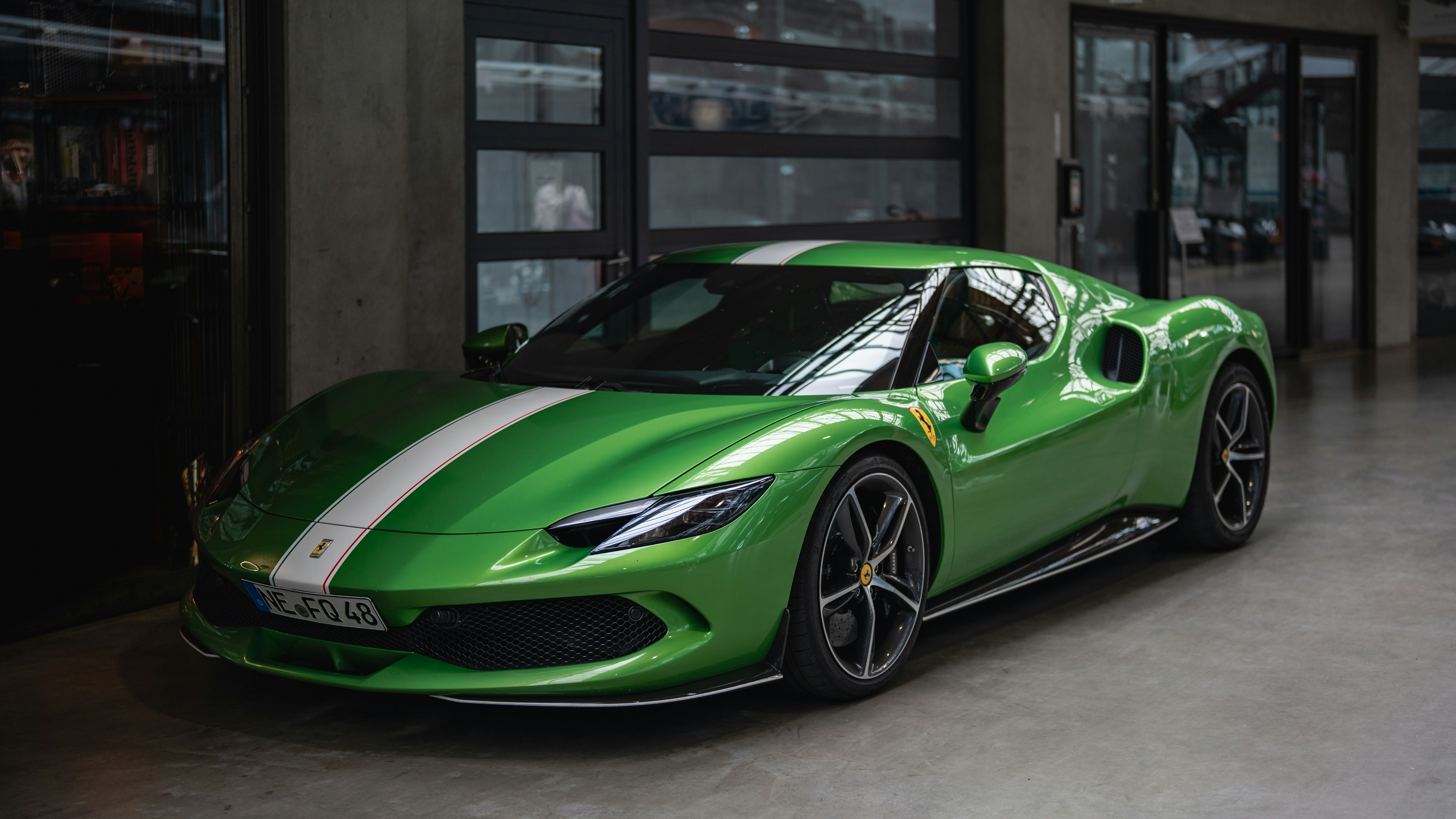 Verdant Velocity: Green Ferrari in an Industrial Showroom