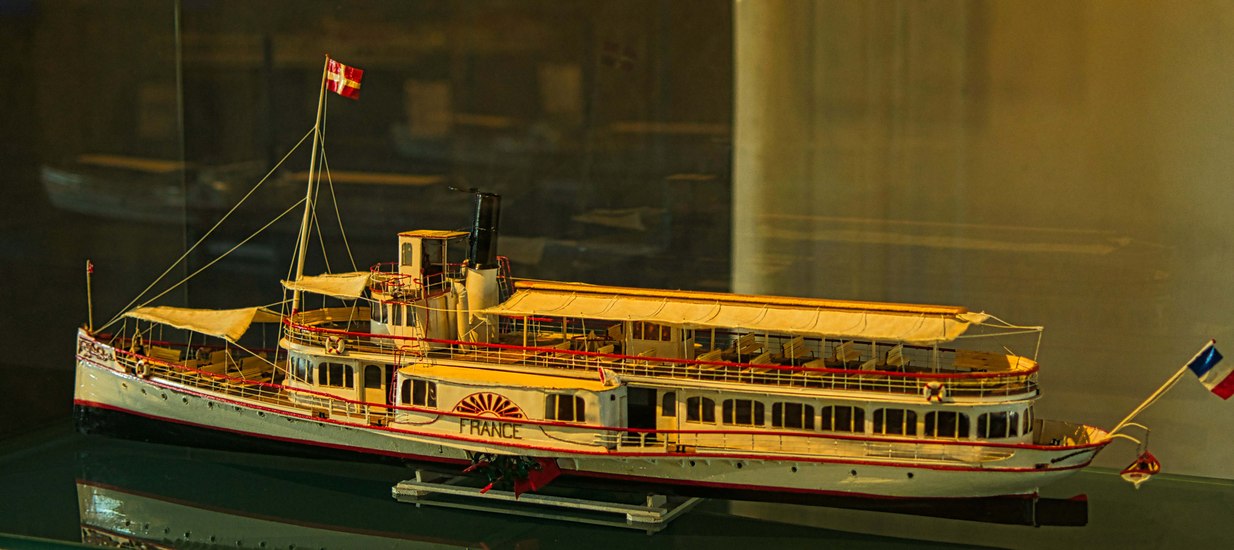 Miniature Steamer on Quiet Glassy Water