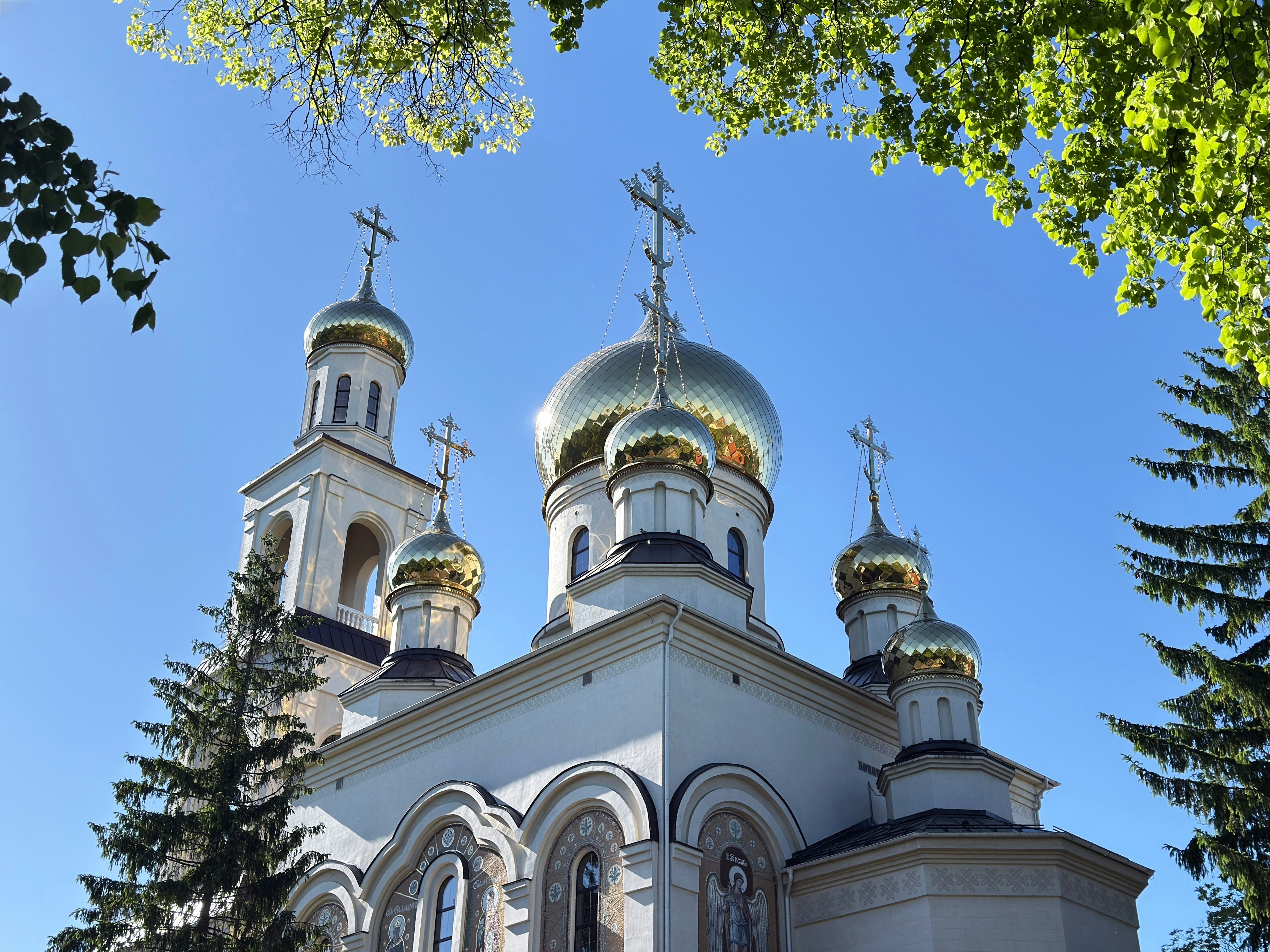 Golden-domed Cathedral Reaching Toward a Clear Sky