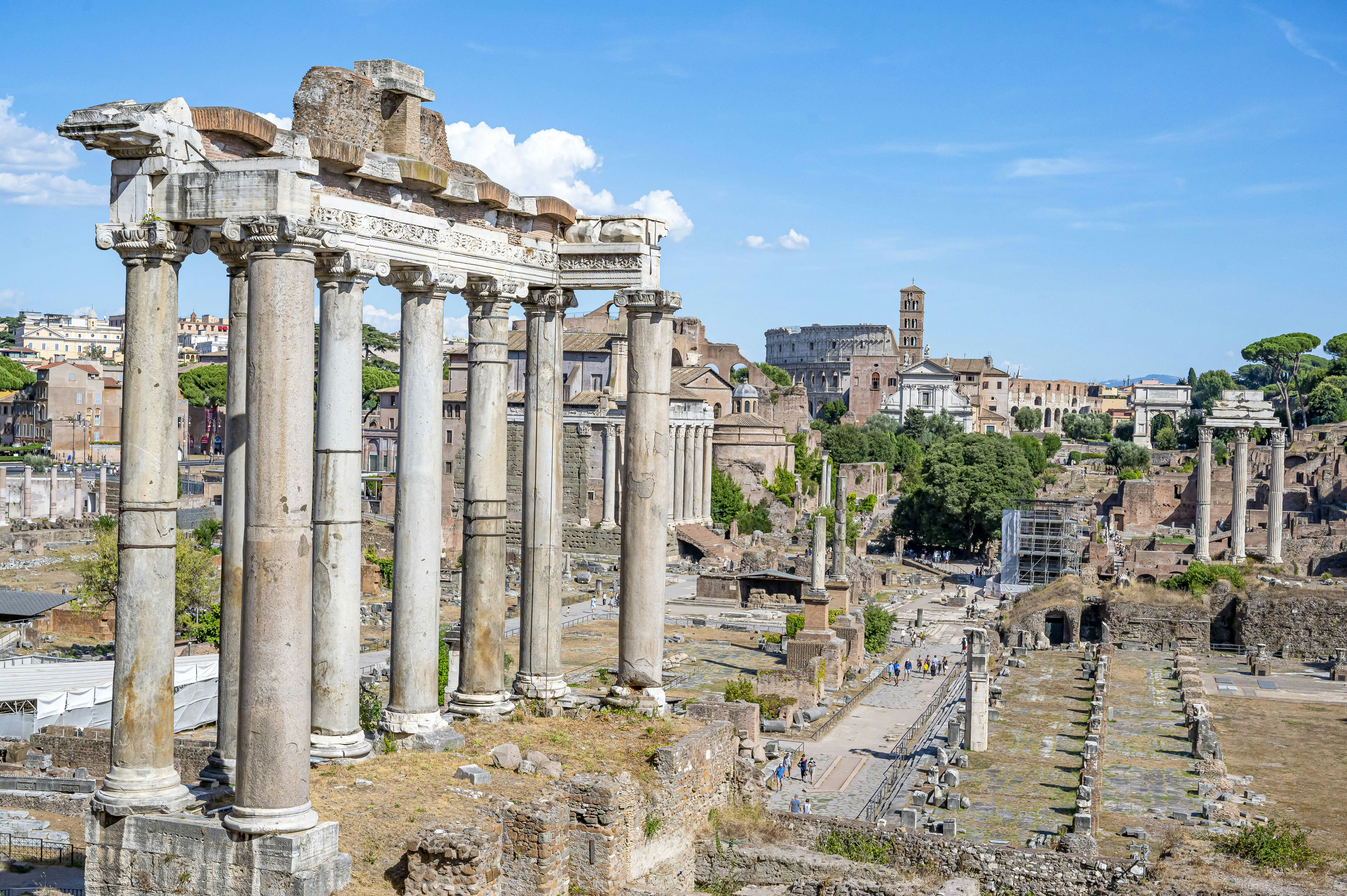 Columns of Time: Ancient Ruins Under a Clear Roman Sky