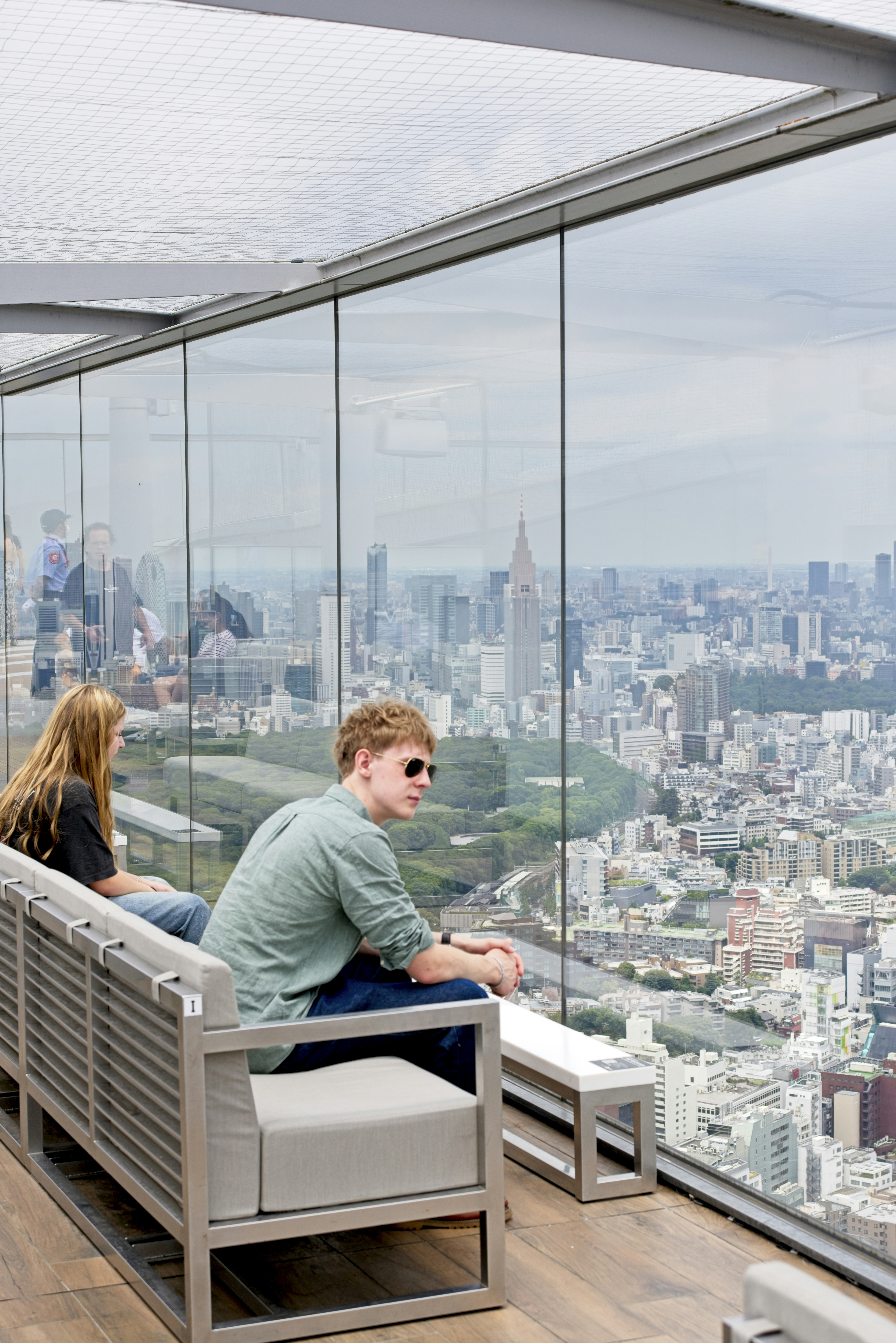 Cityscape Reflections: Conversation on the Glass
