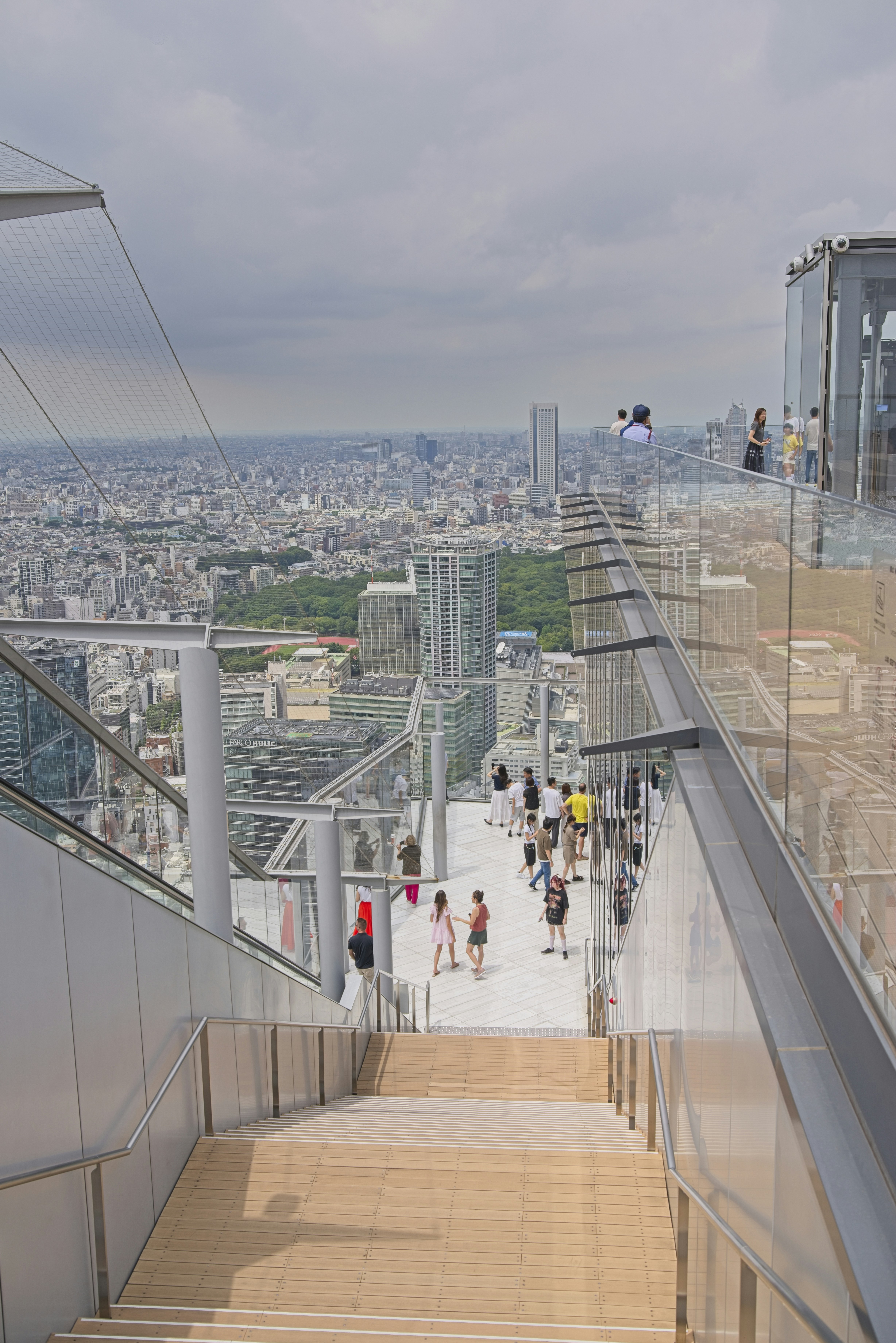 Glass-strewn Skywalk Over Tokyo’s Horizon