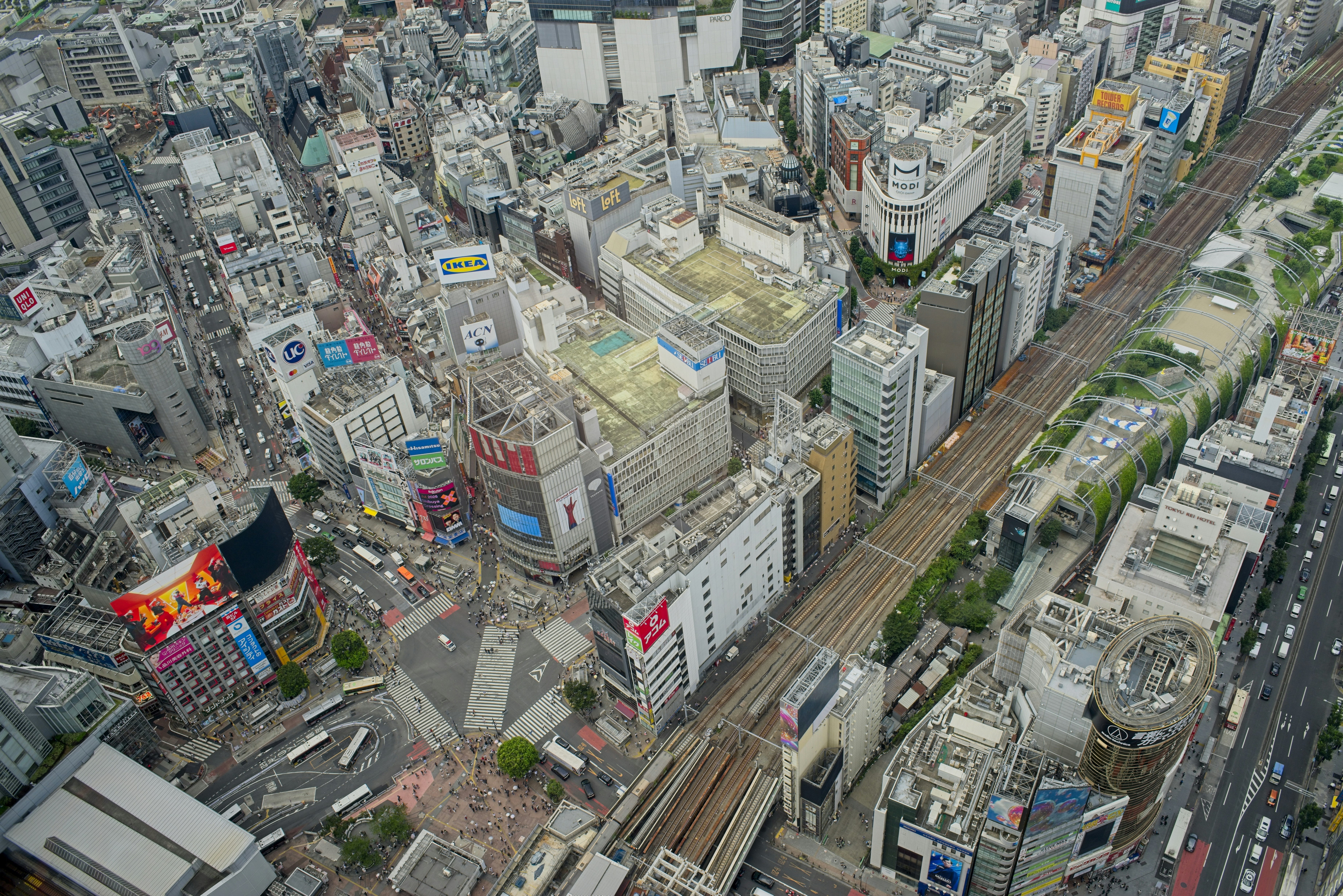 Aerial Tapestry: City Grid with Elevated Rail Slice