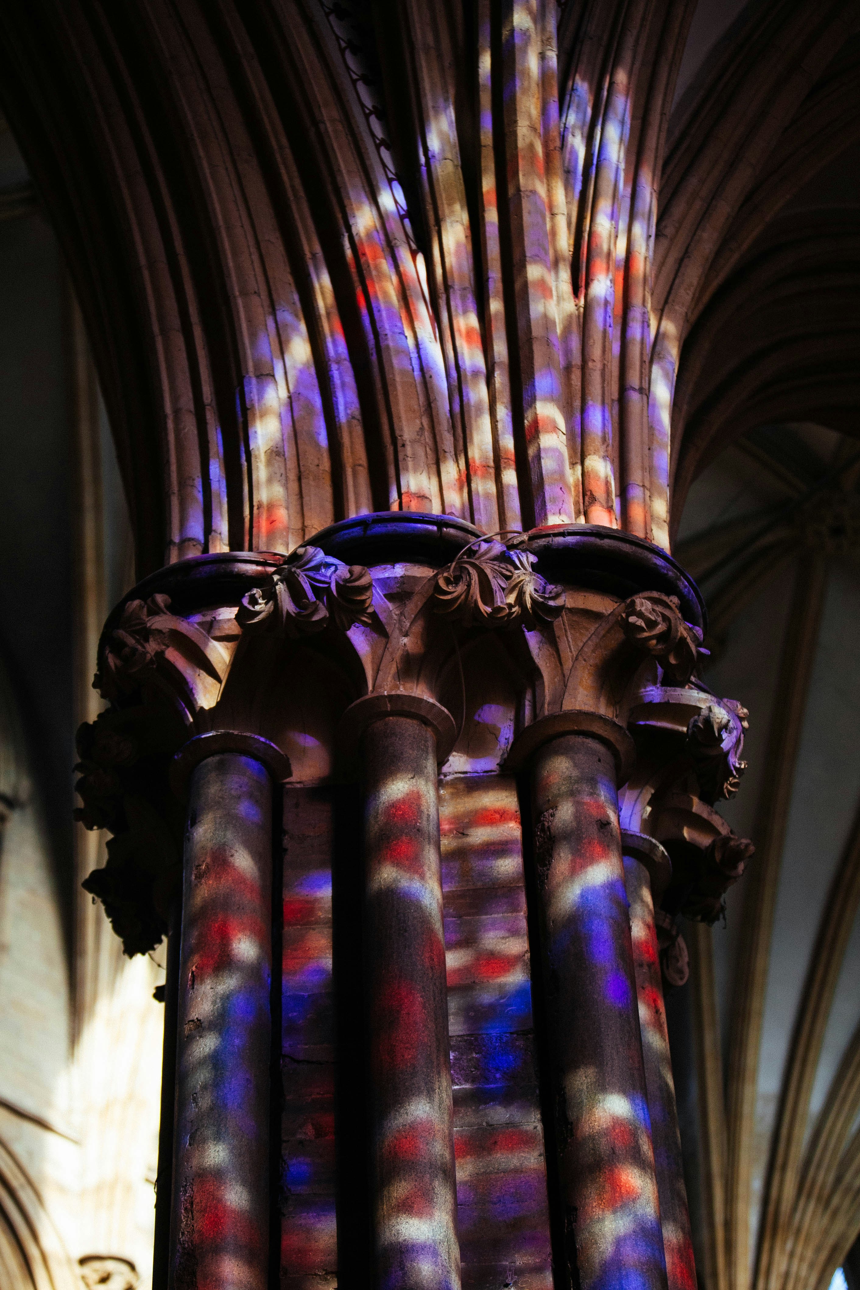 Stained Light on Gothic Columns: A Prism of Stone