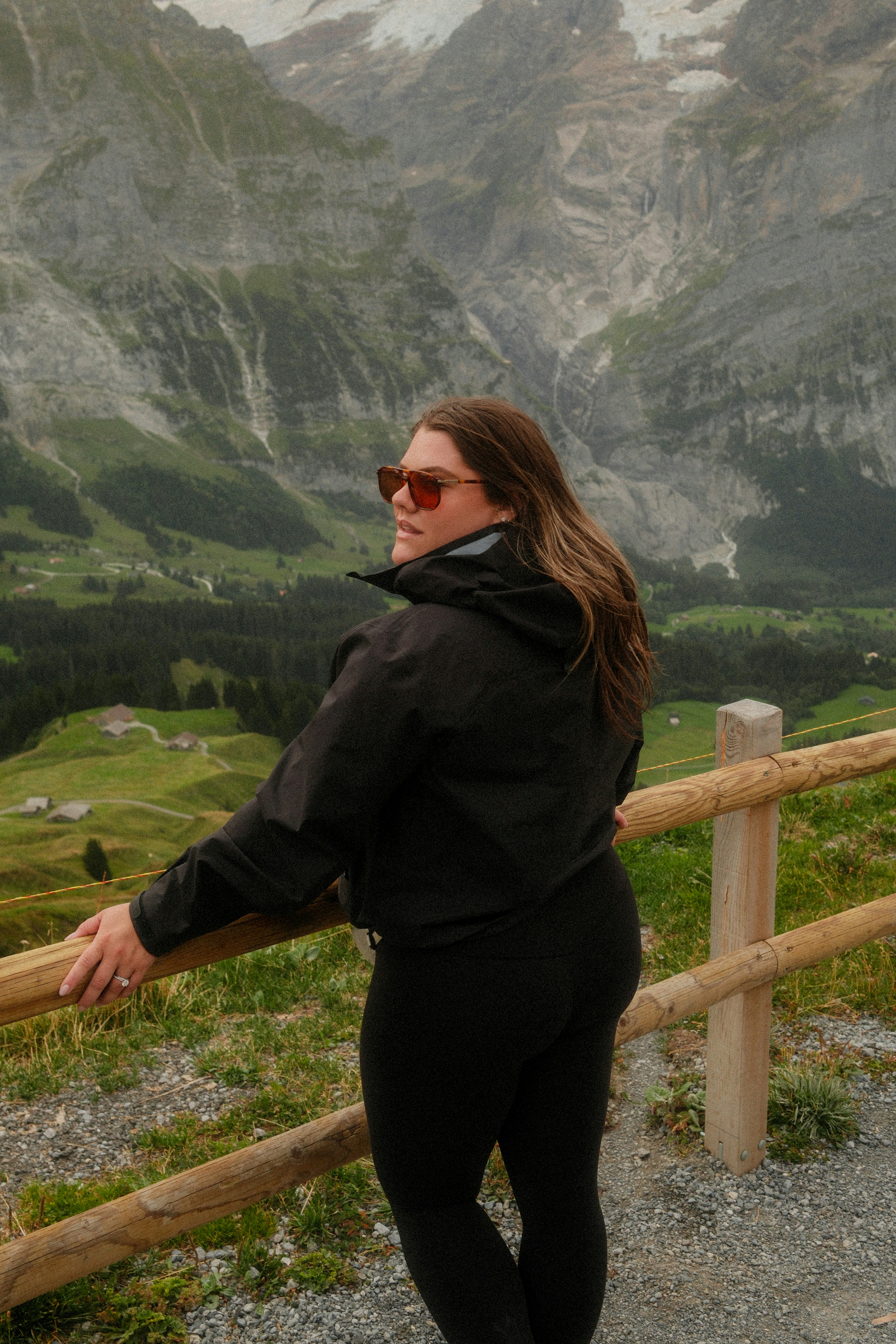 Ridgeview Resolve: Woman in Black Against Alpine Vista