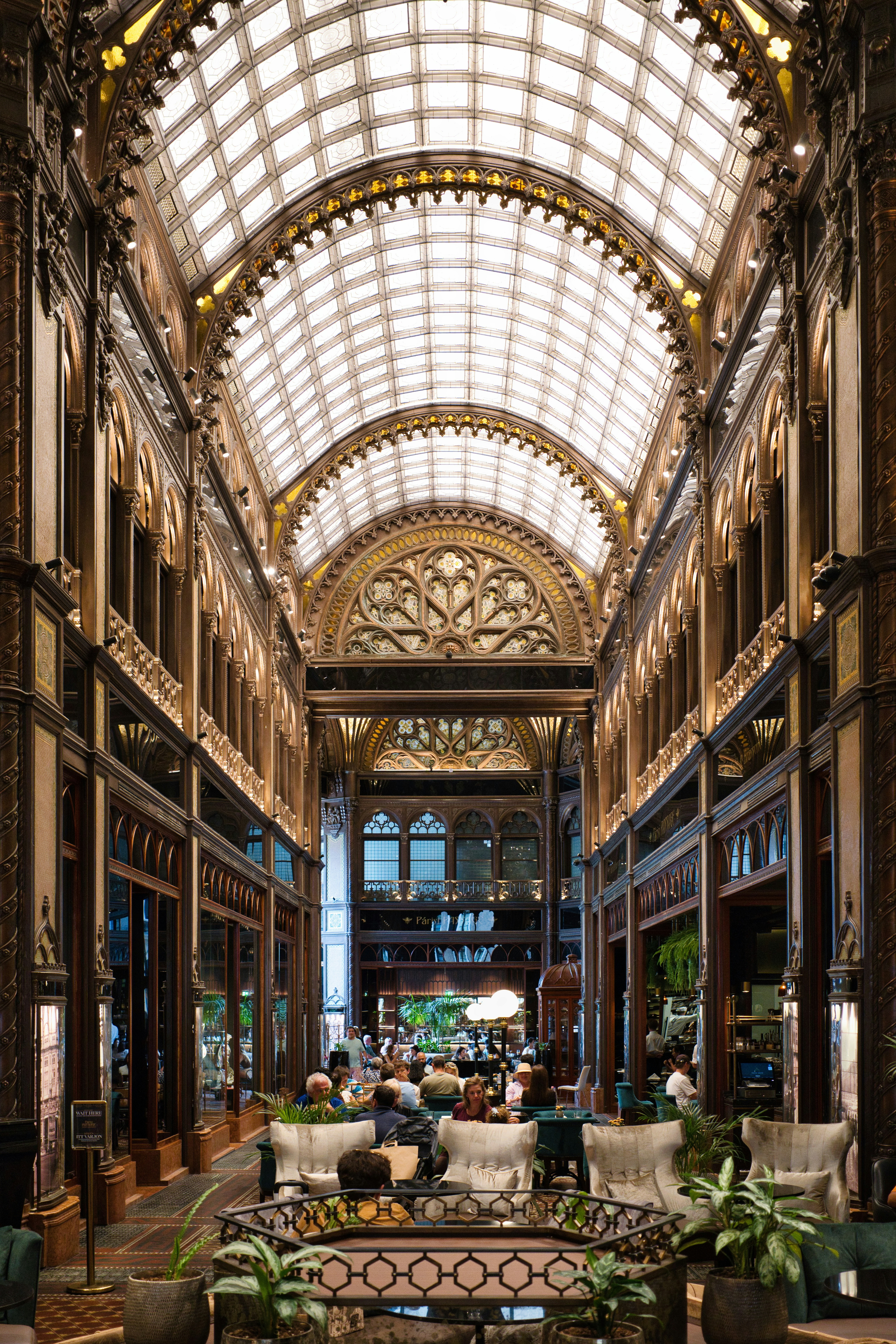 Sunlit Glass Vaults: A Grand Gilded Hall of Quiet Social Streams