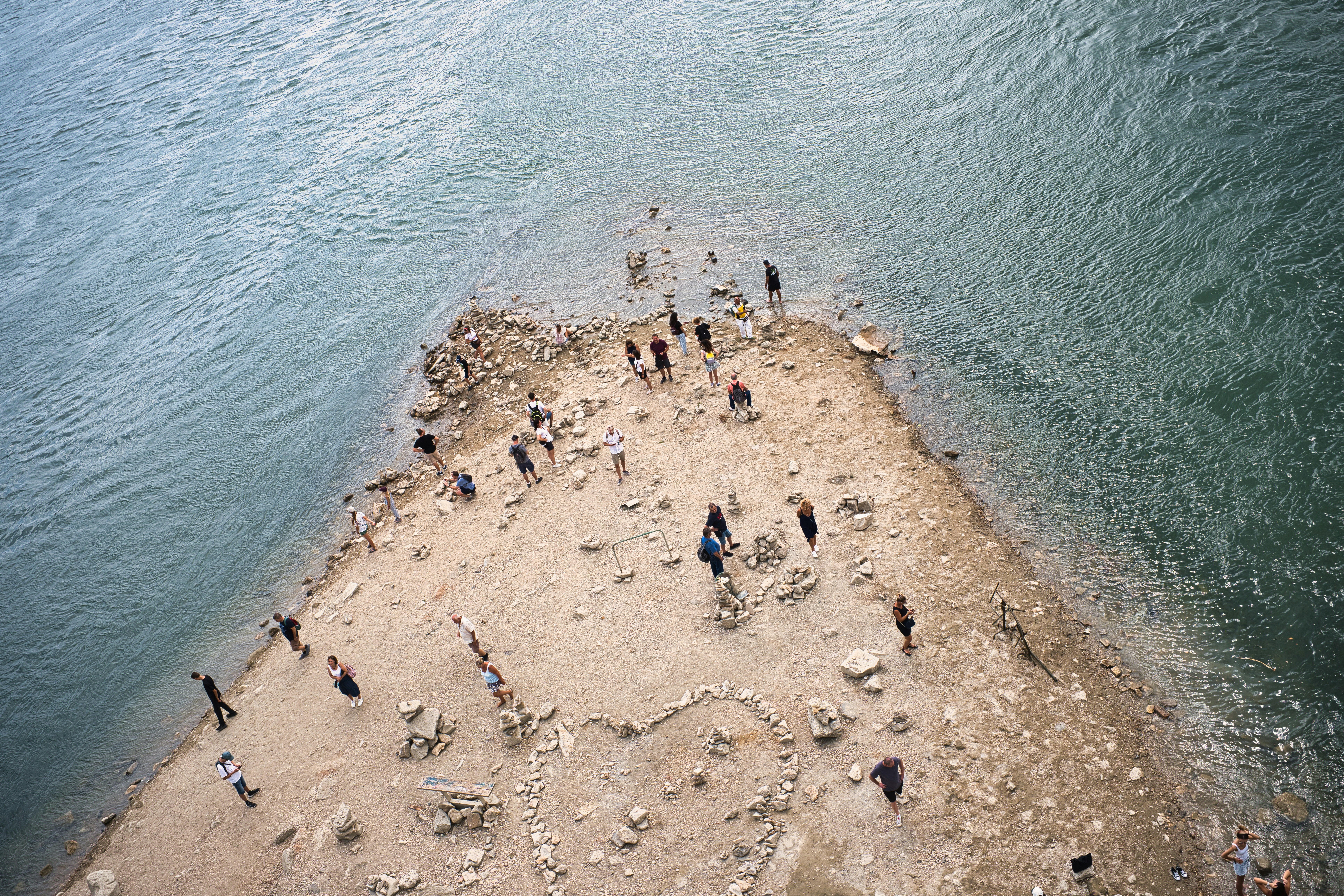Heart of the Causeway: A Pebble Pathway by the Sea