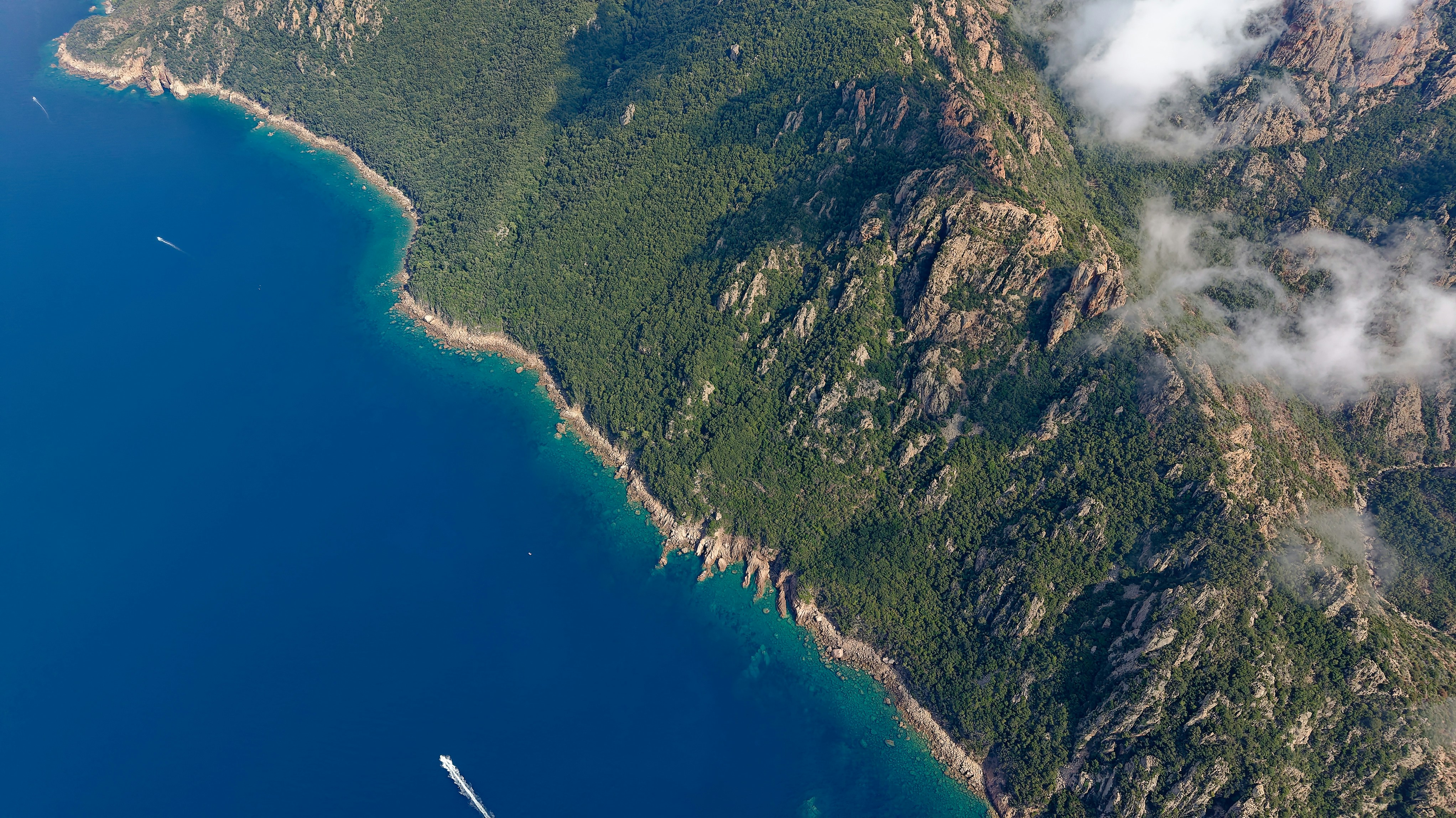 Coastal Cliffs and Turquoise Waters from an Aerial View
