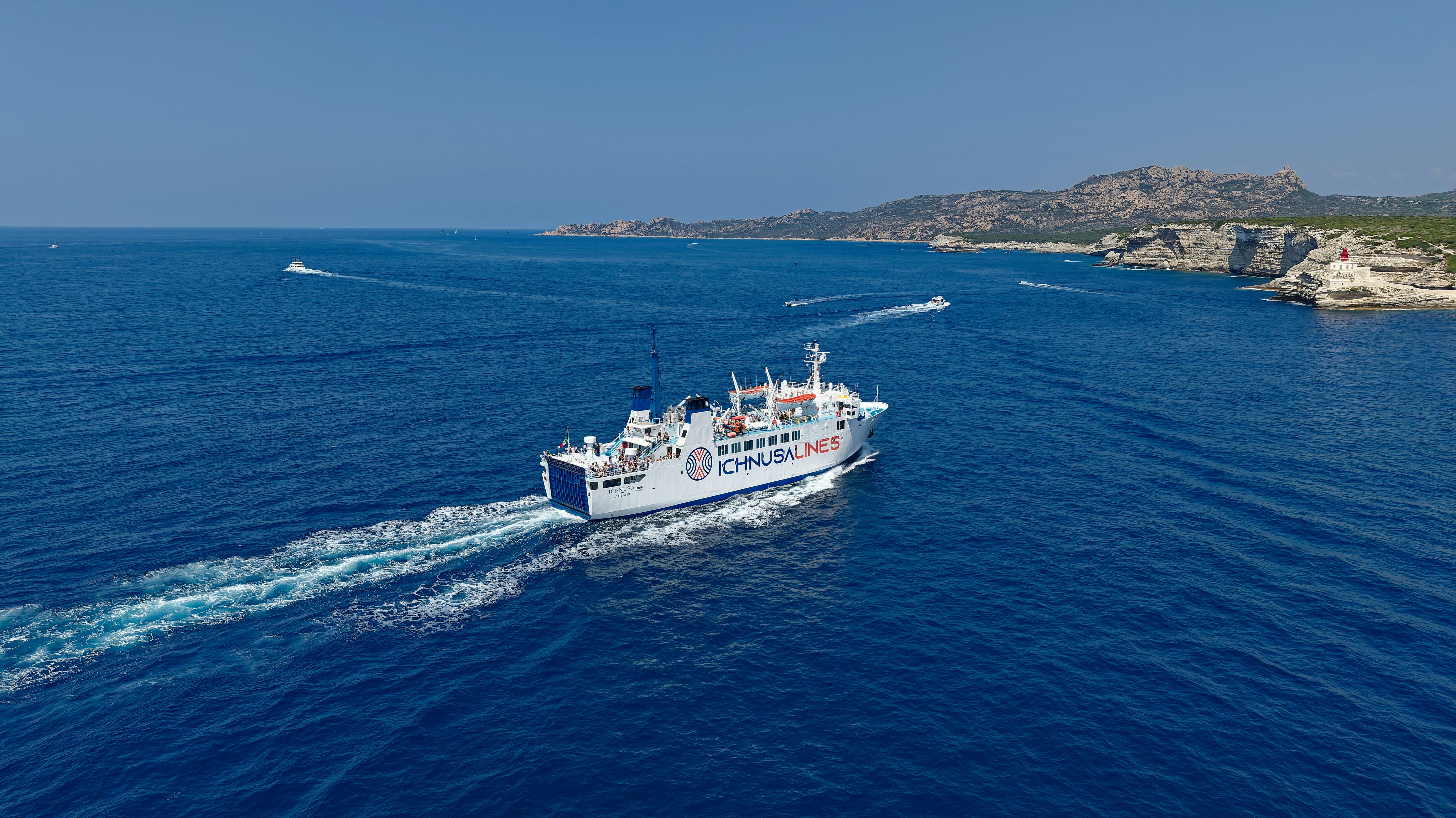 Blue Passage: A Ferry Cutting the Atlantic Wake
