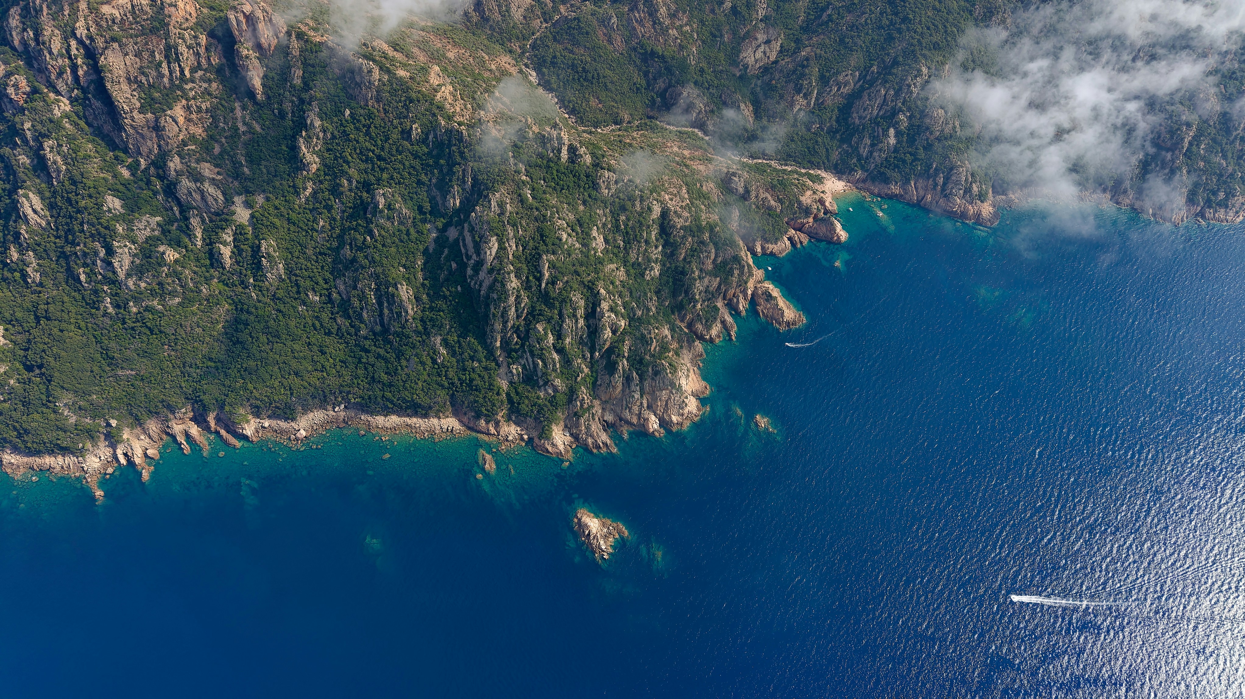 Azure Coastline: Cliff edge meeting Mediterranean-like waters from above