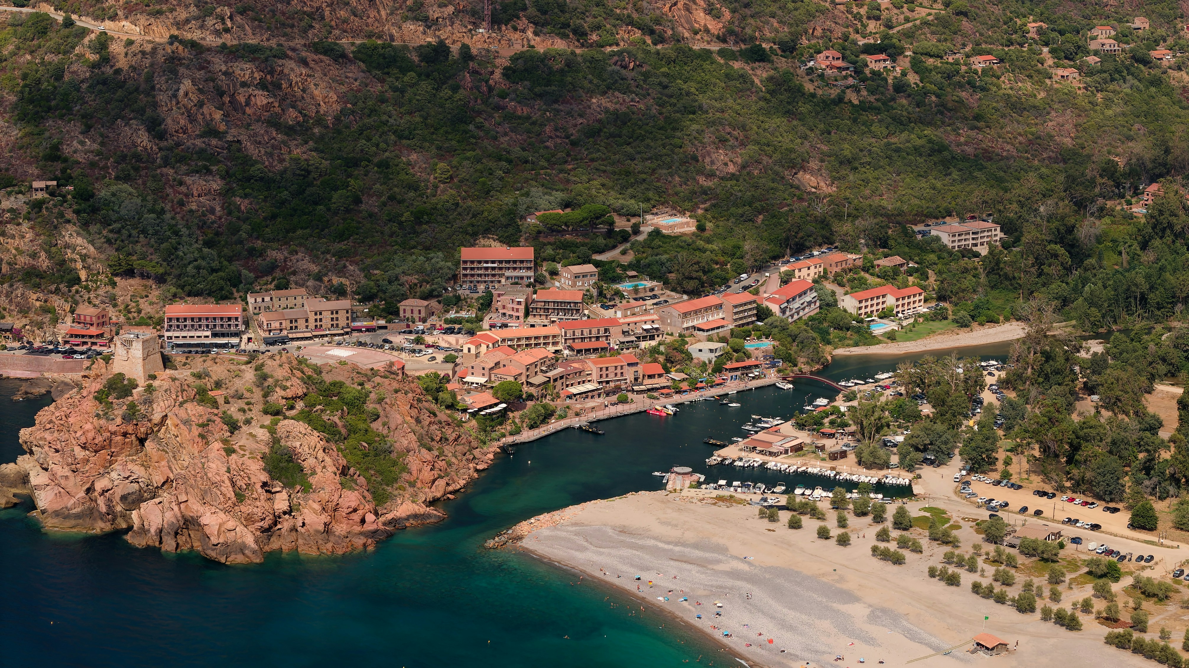 Harbor Village Nestled Along Rocky Coastal Slopes