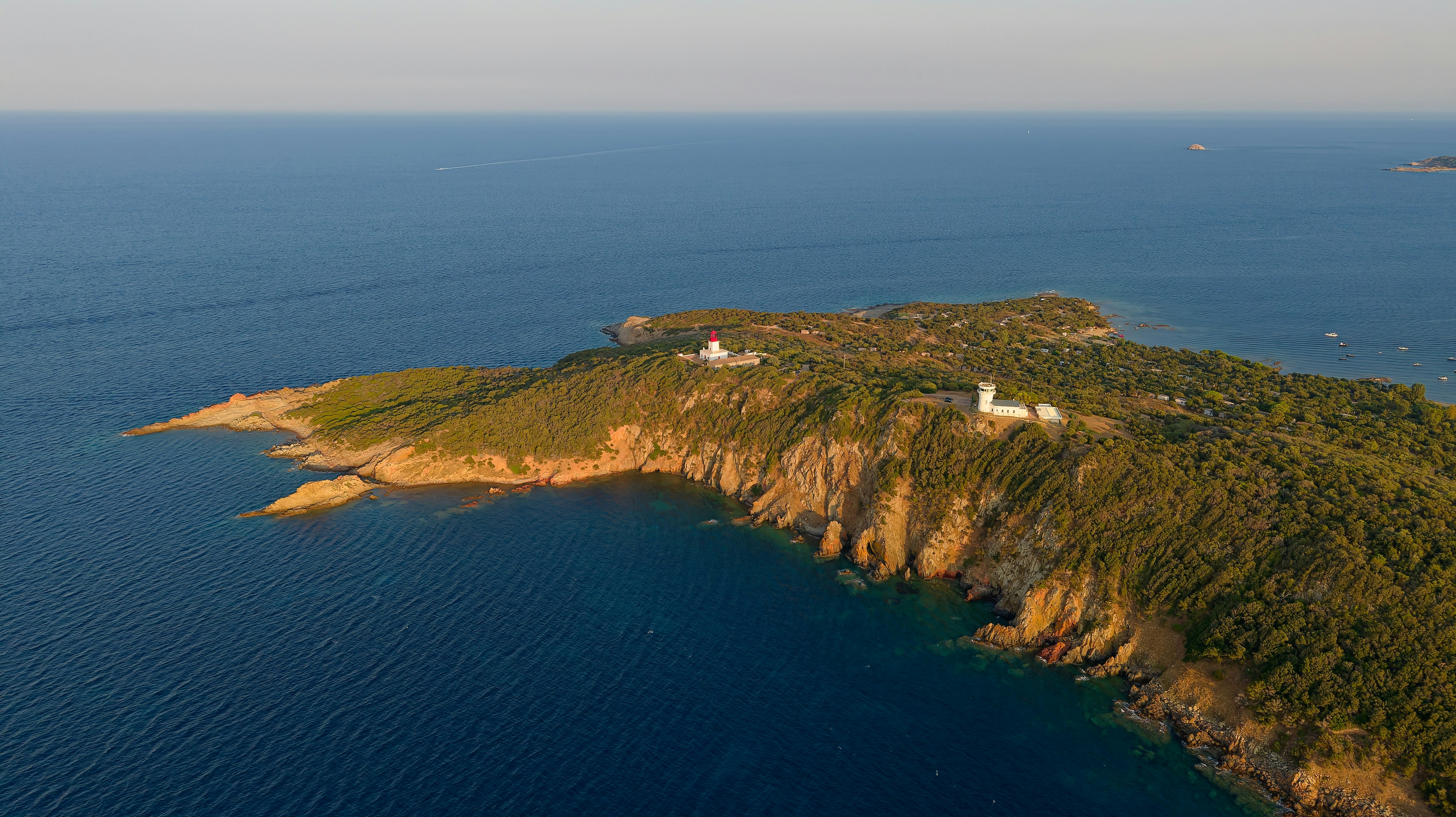 Clifftop Beacon: Aerial View of Coastal Outcrop with Lighthouses