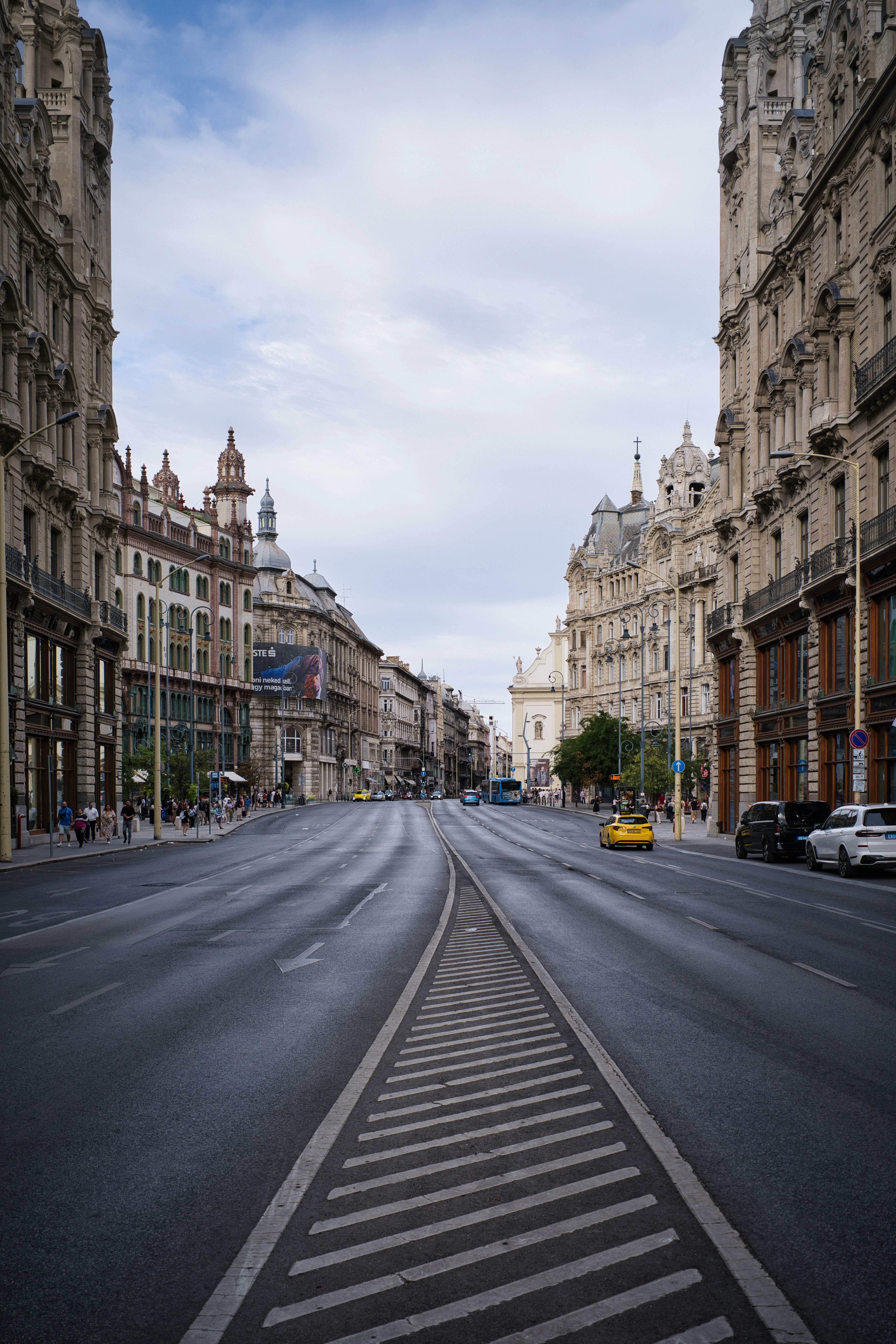 A Wide Avenue of Historic Grandeur Down the City Spine
