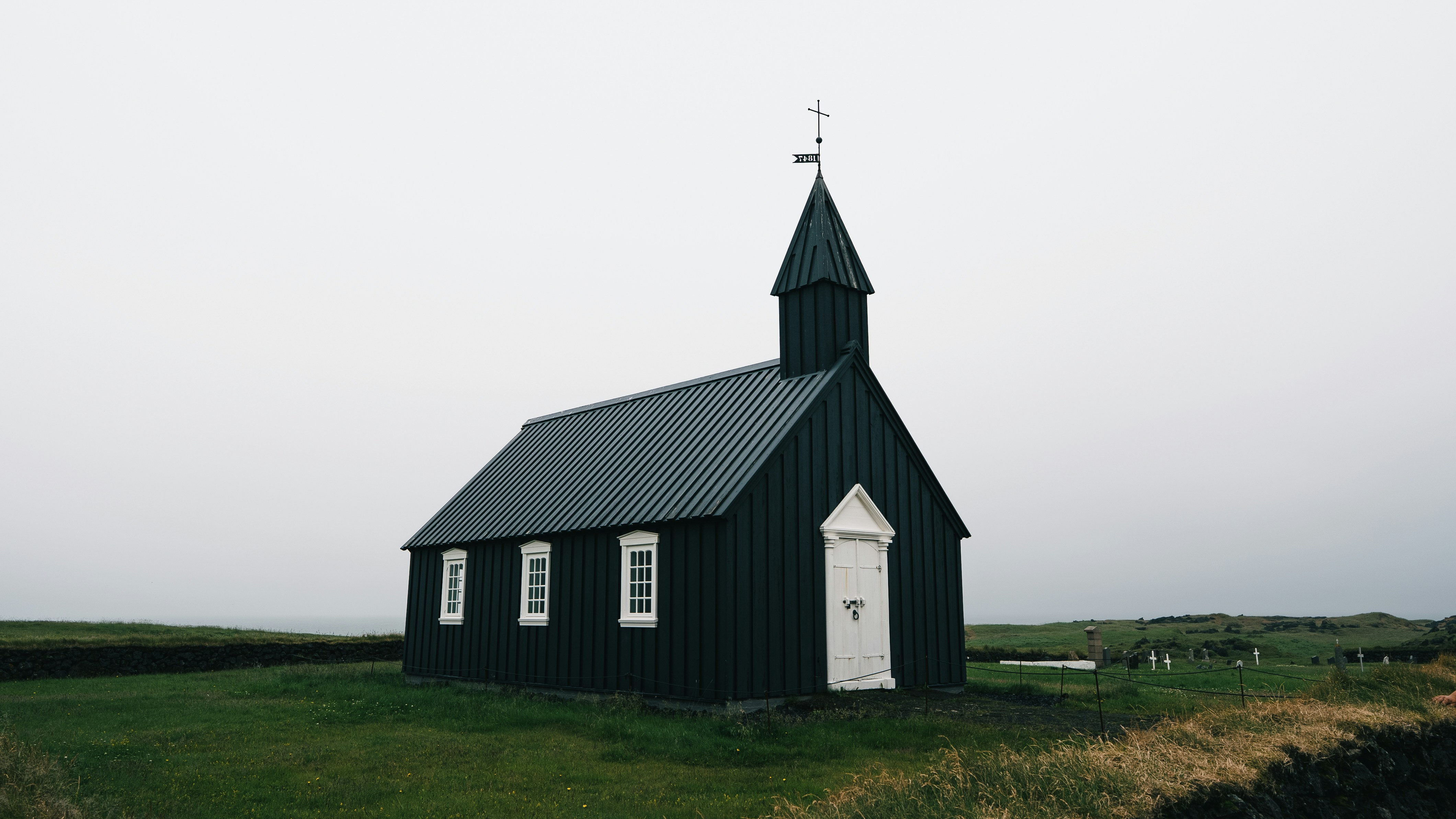 Stitched in the Highlands: A Quiet Black Chapel on Open Grass