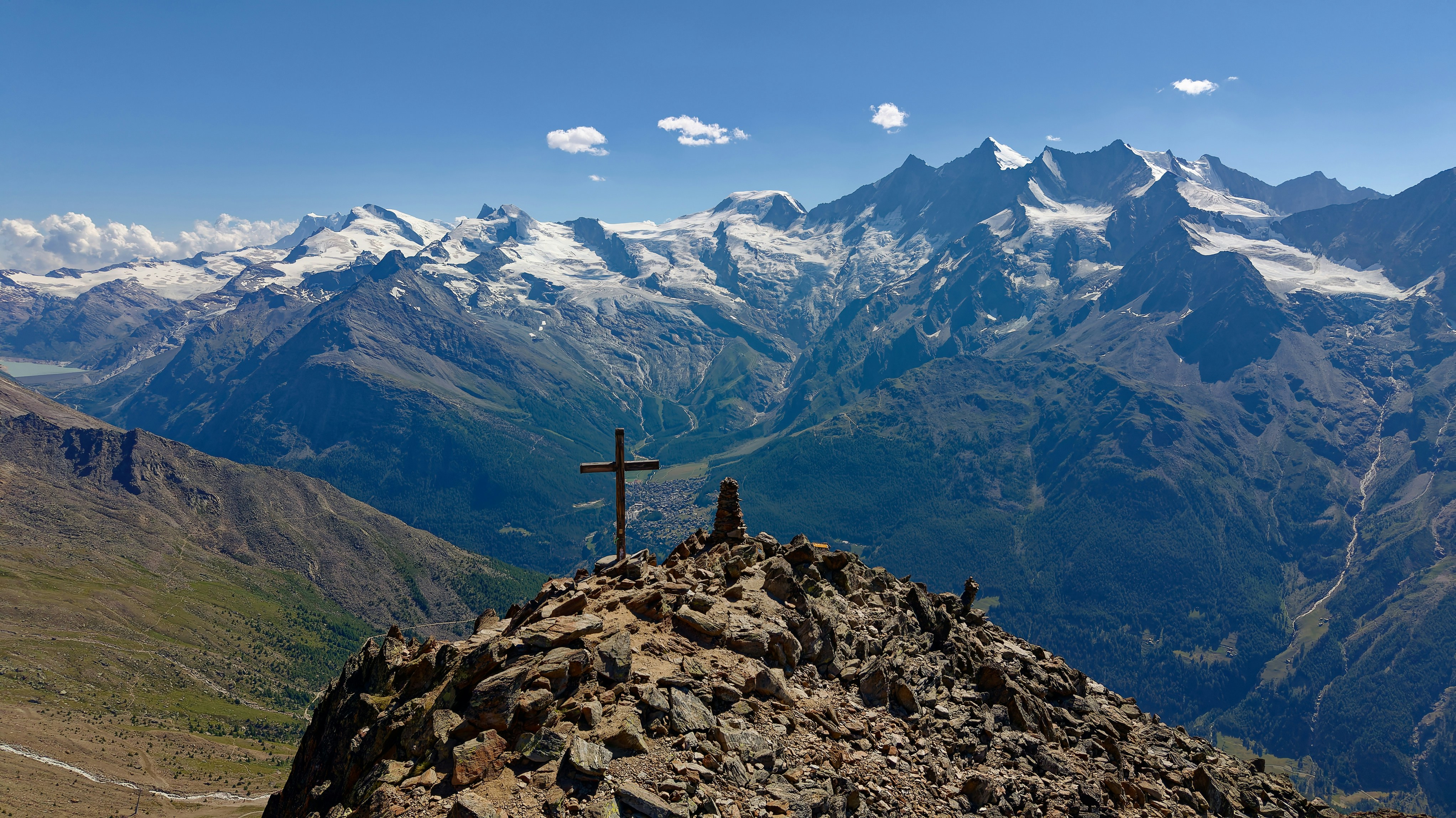 Summit Cross Overlooking Glacial Valleys