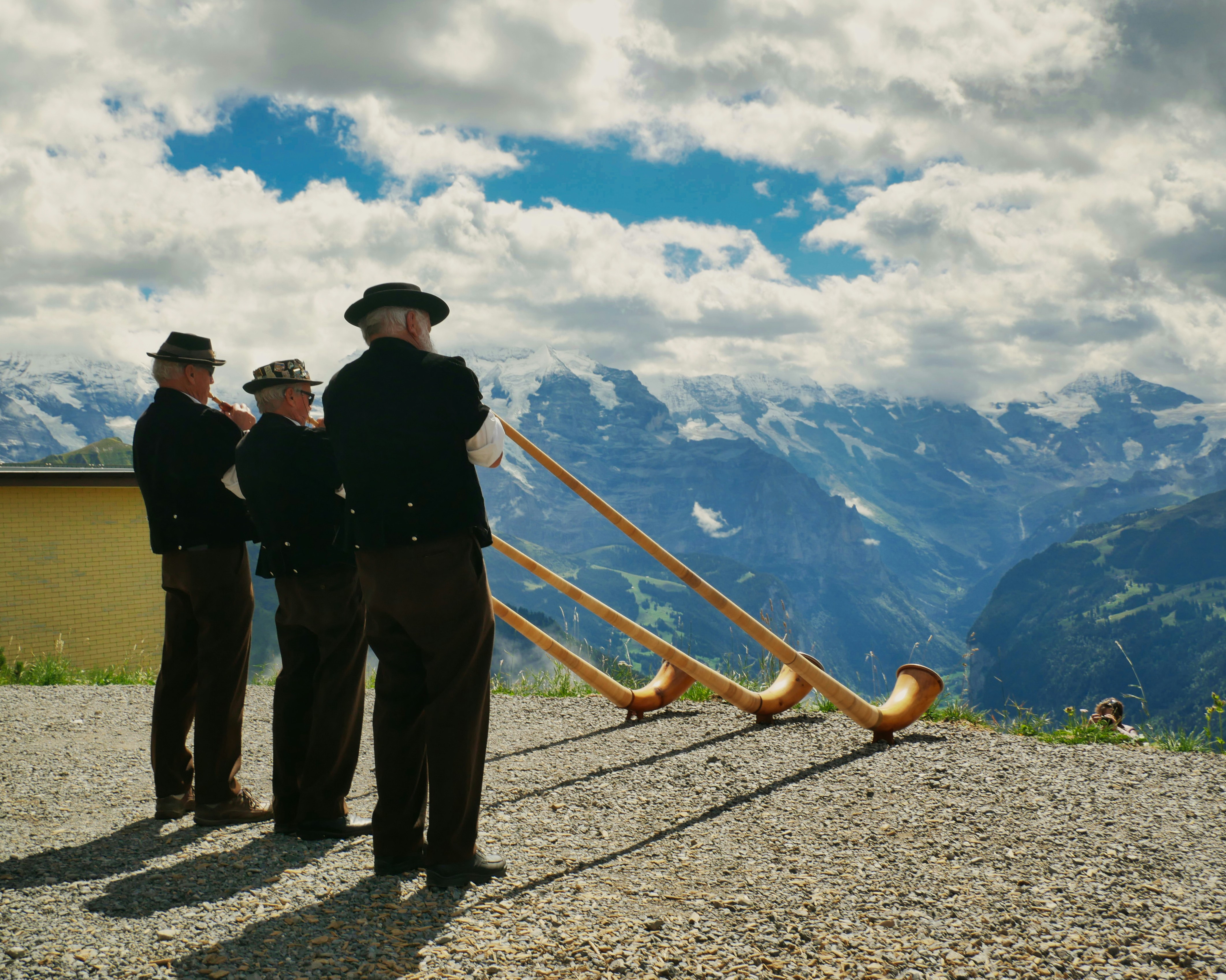 Harmonized Portrait of Alpine Musicians by the Edge of the World