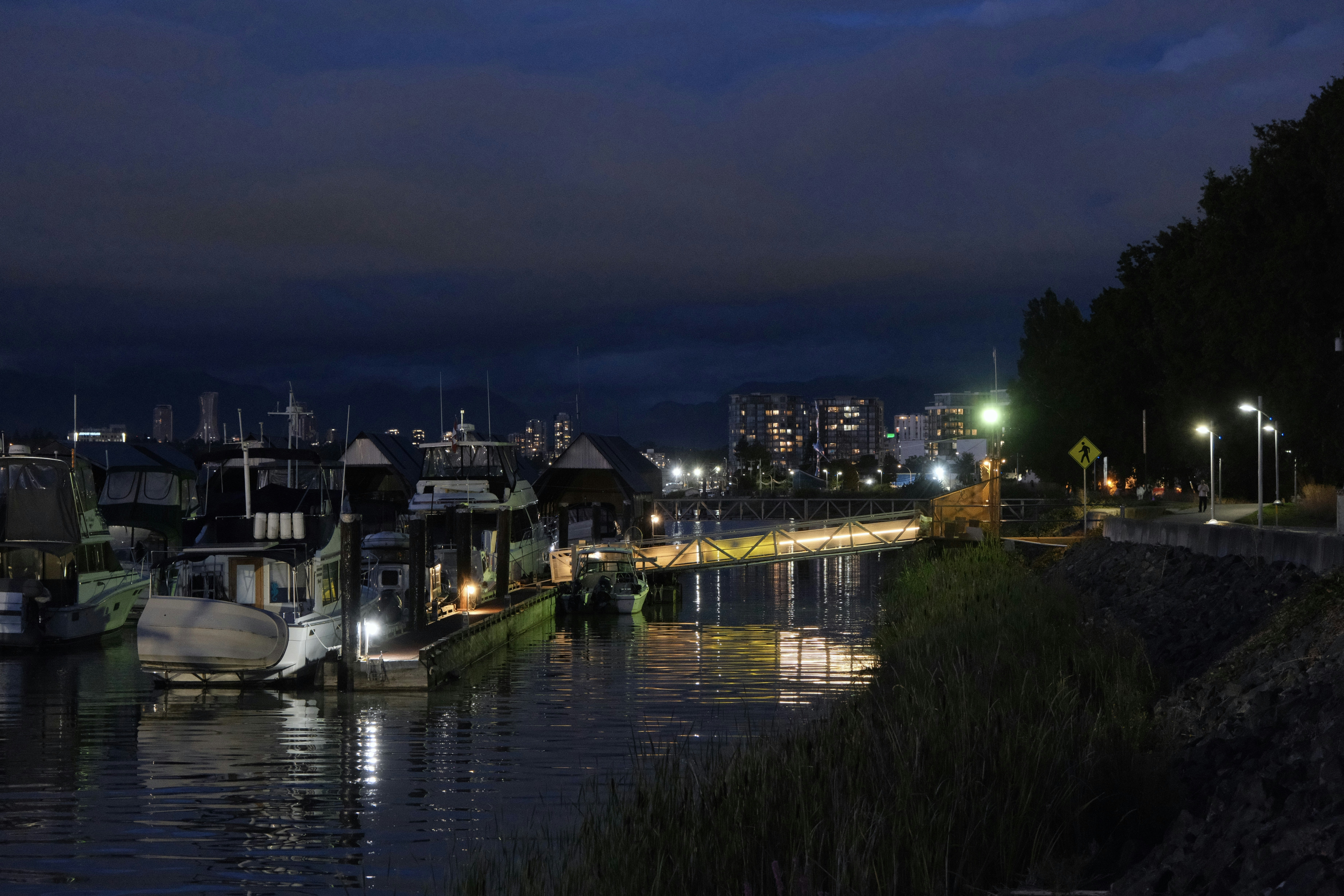 Night Harbor: Boats, Lights, and a Quiet Bridge