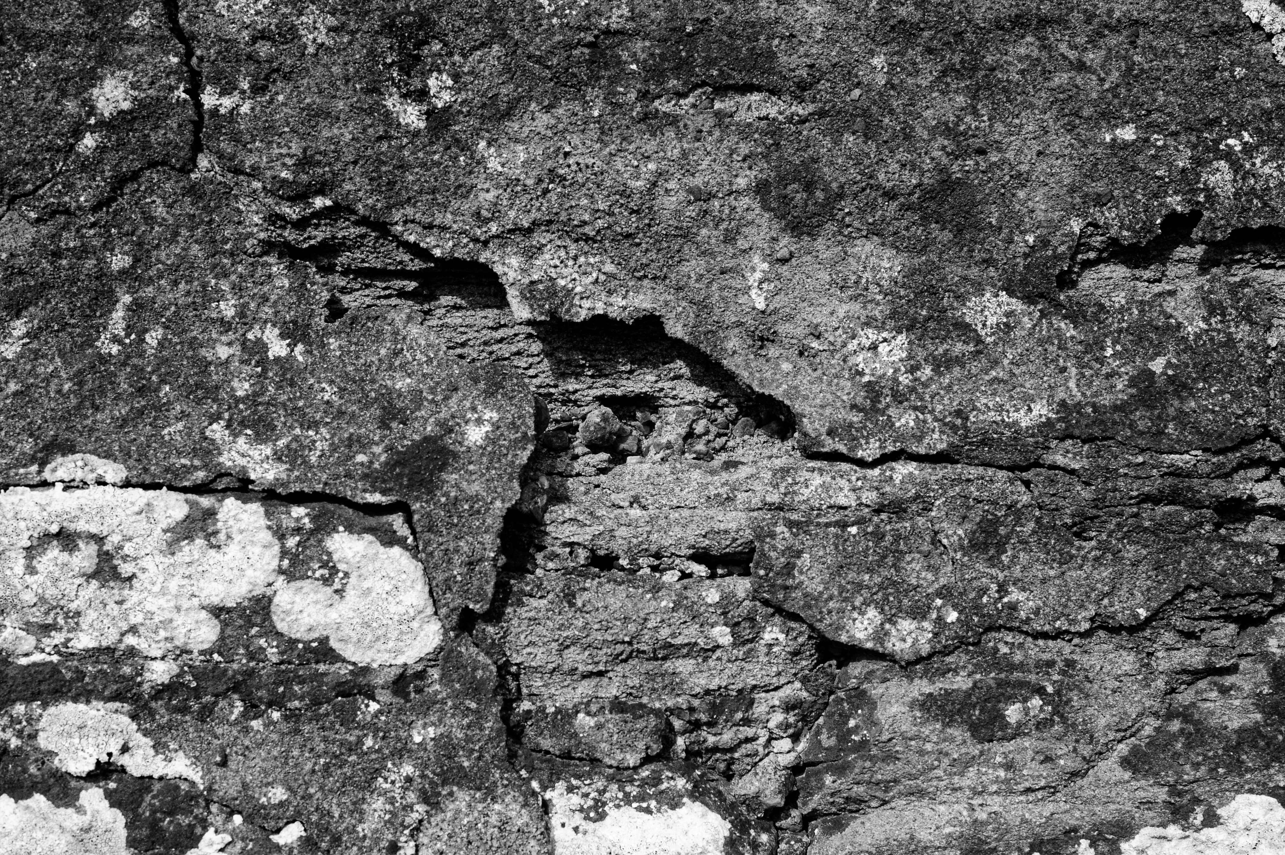 Cracked Stone Mosaic: Subtle Light and Shadow in Monochrome Texture