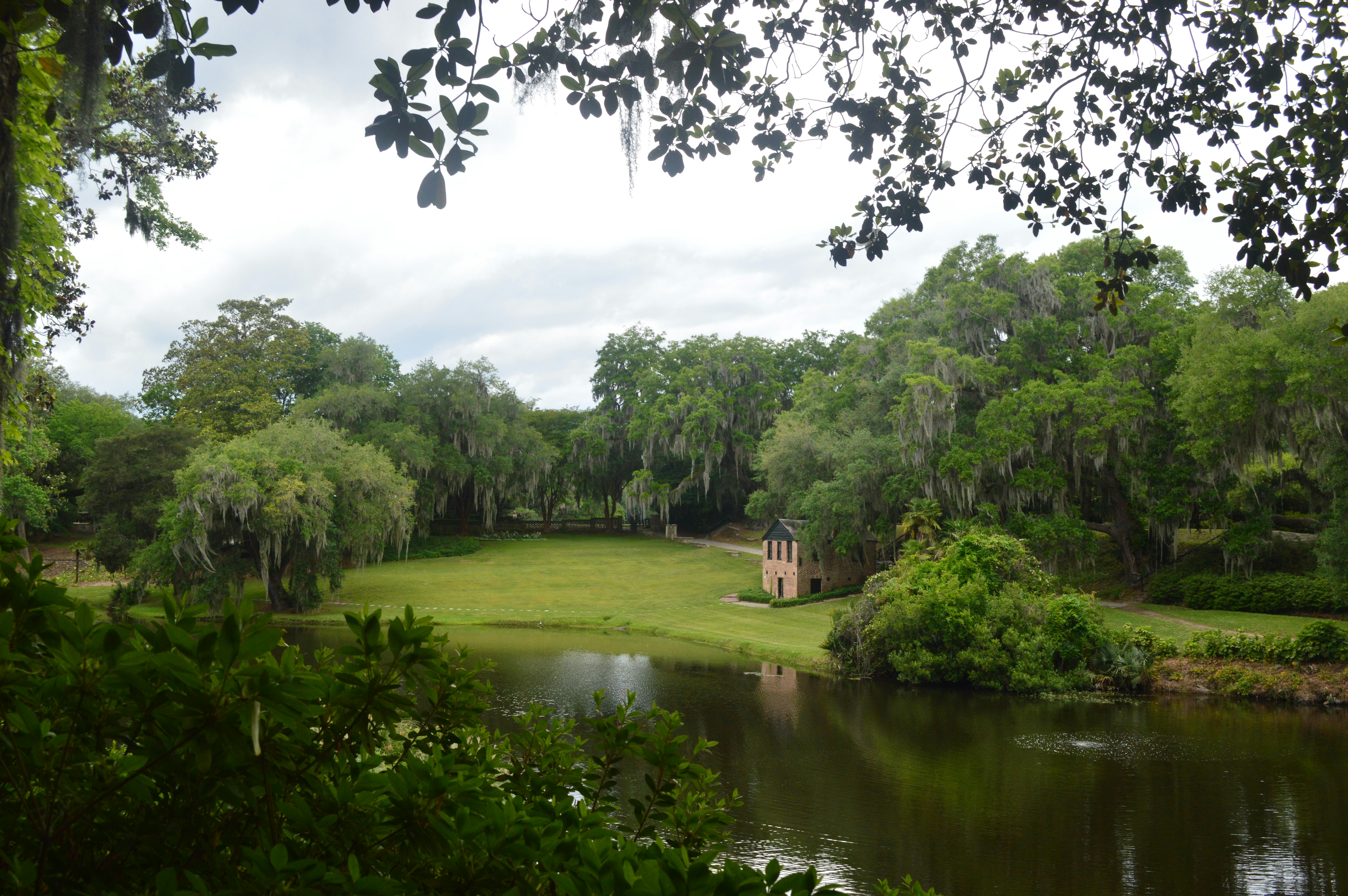 Quiet Lake Manor: A Riverside Clearing with a Distant Cottage