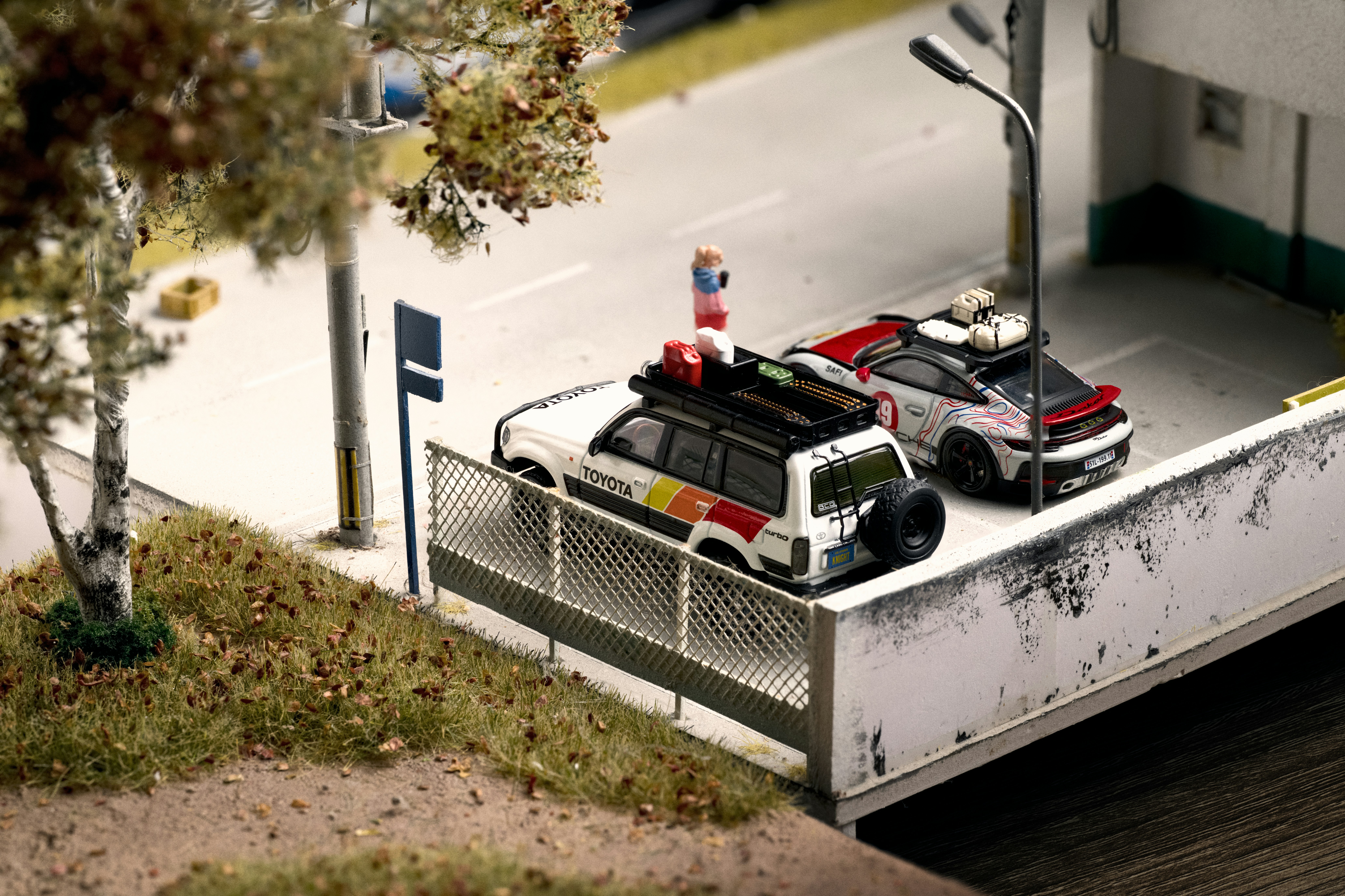 Miniature Rescue: Toy SUV and Off-Road Patrol Guard a Tiny Lot