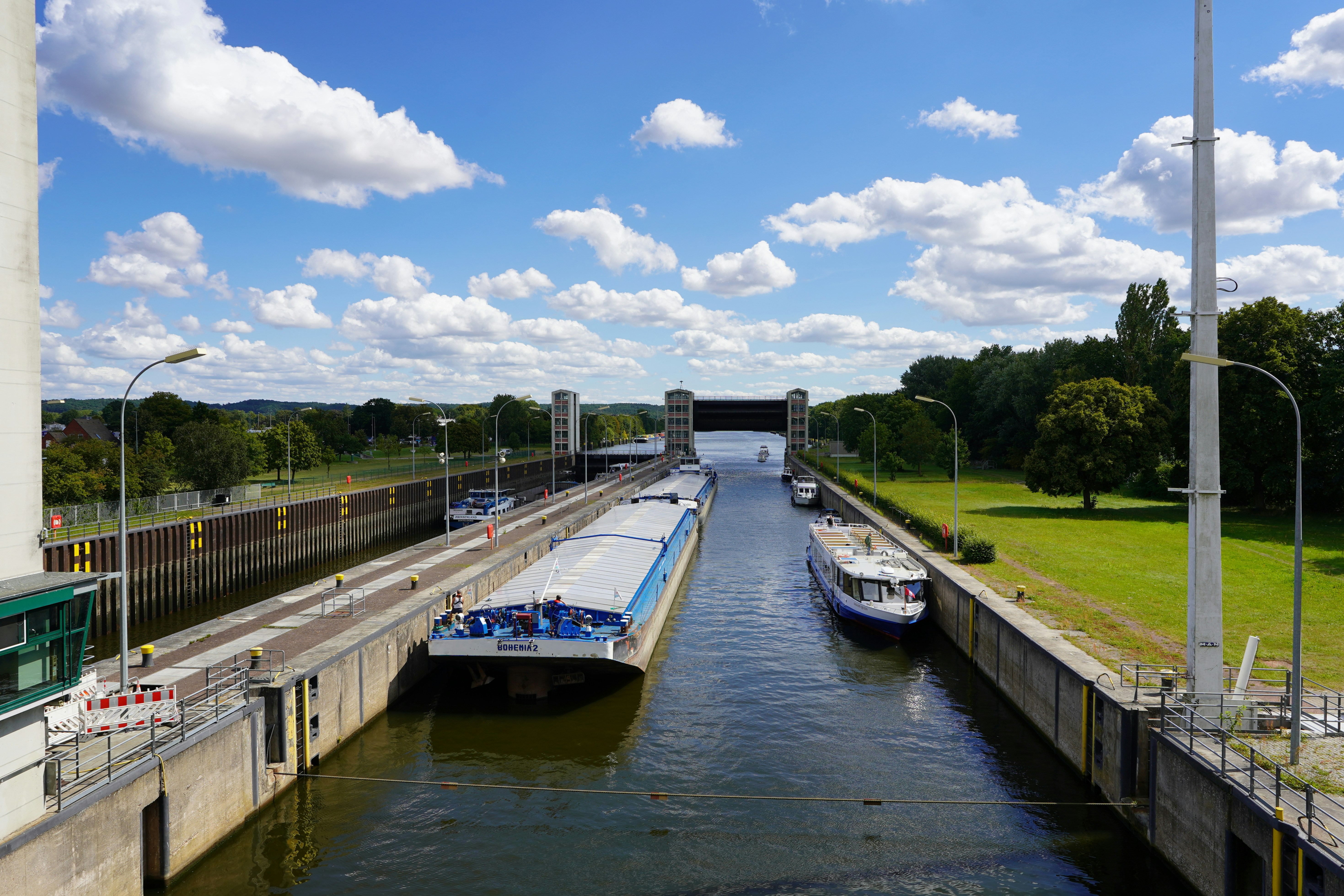 Lock Gate Perspective: Boats Entering a Wide Canal Cut