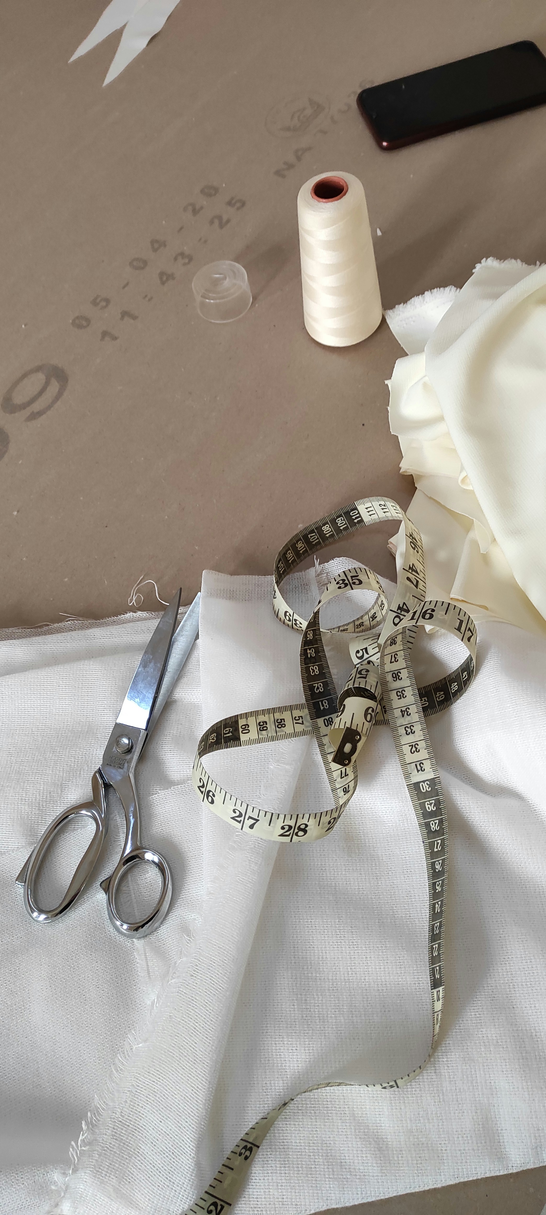 Threads of Focus: Craft Tools Rest on a Worktable
