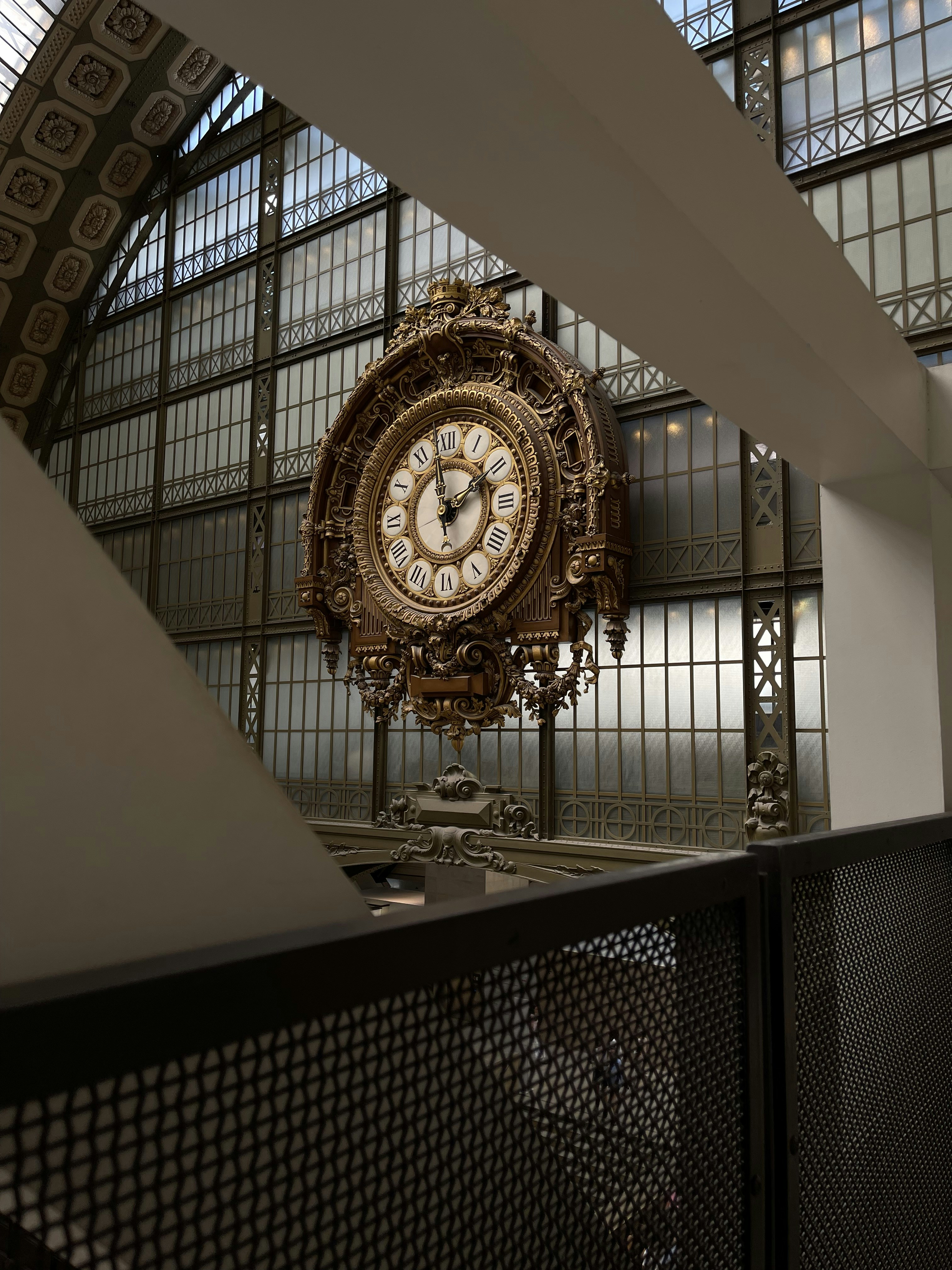 Ornate Clock Above the Glass Atrium