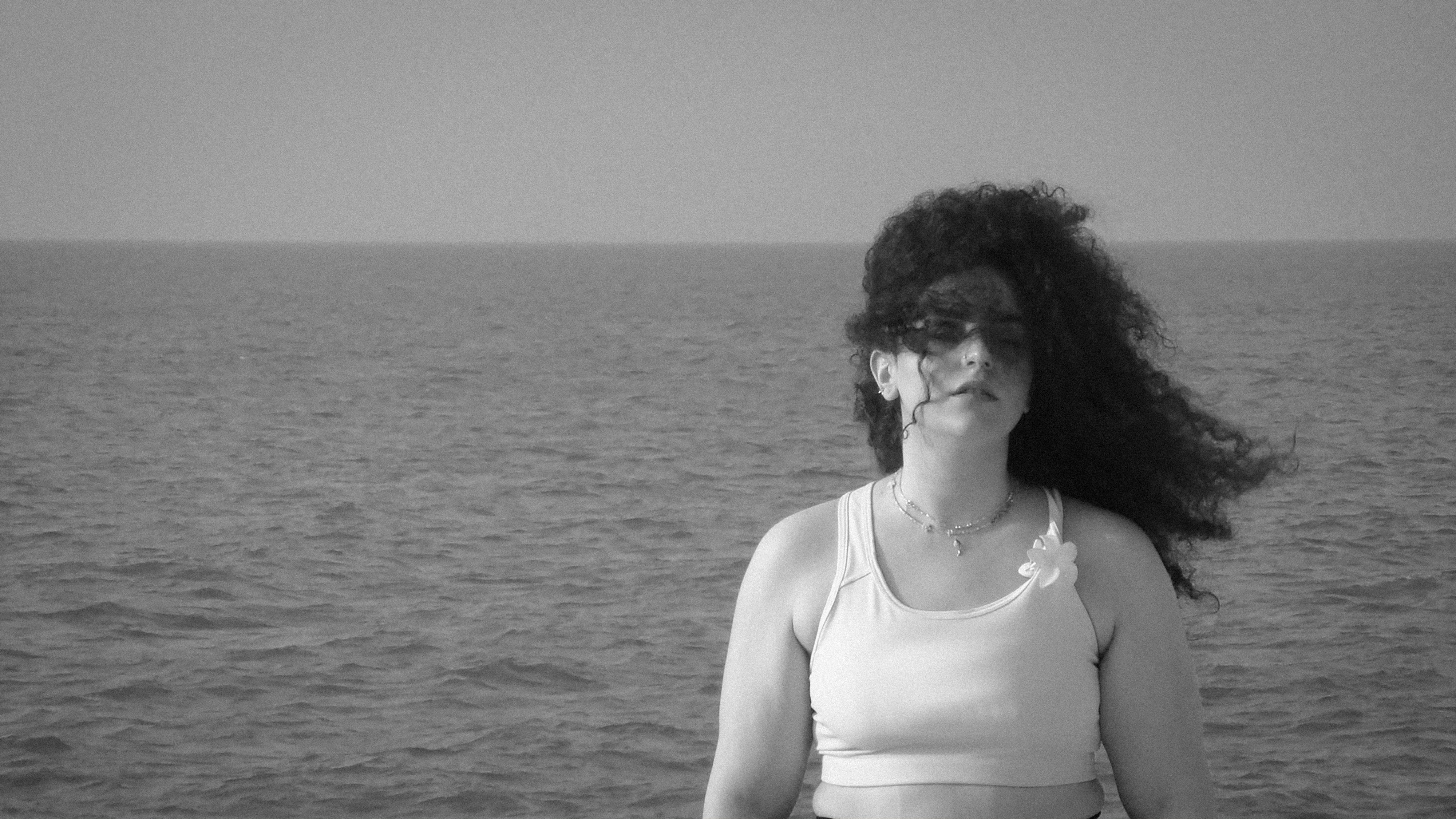 Windward Gaze: A Portrait by the Sea