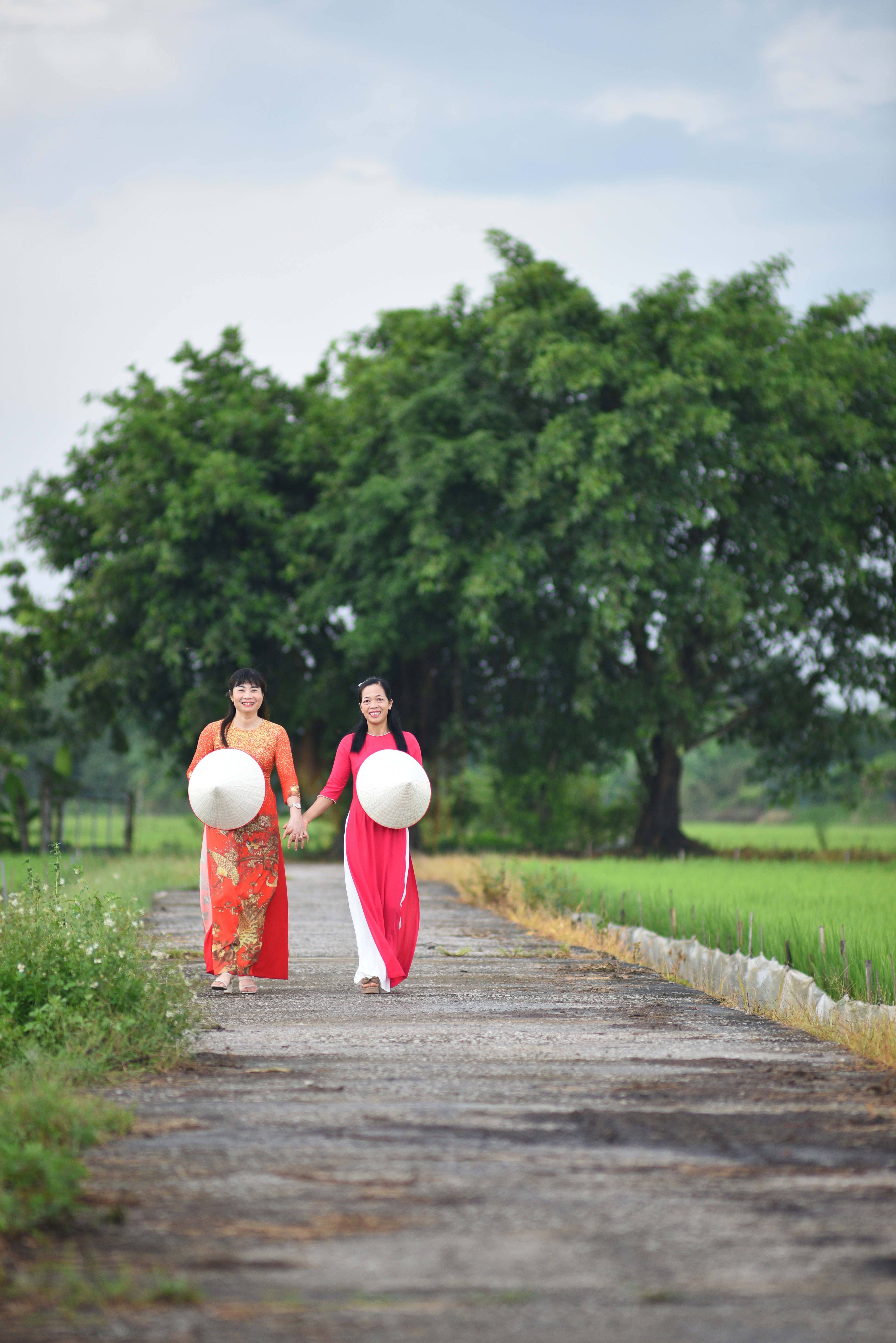 Two Traditional Attire, One Shared Path: A Quiet Rural Moment