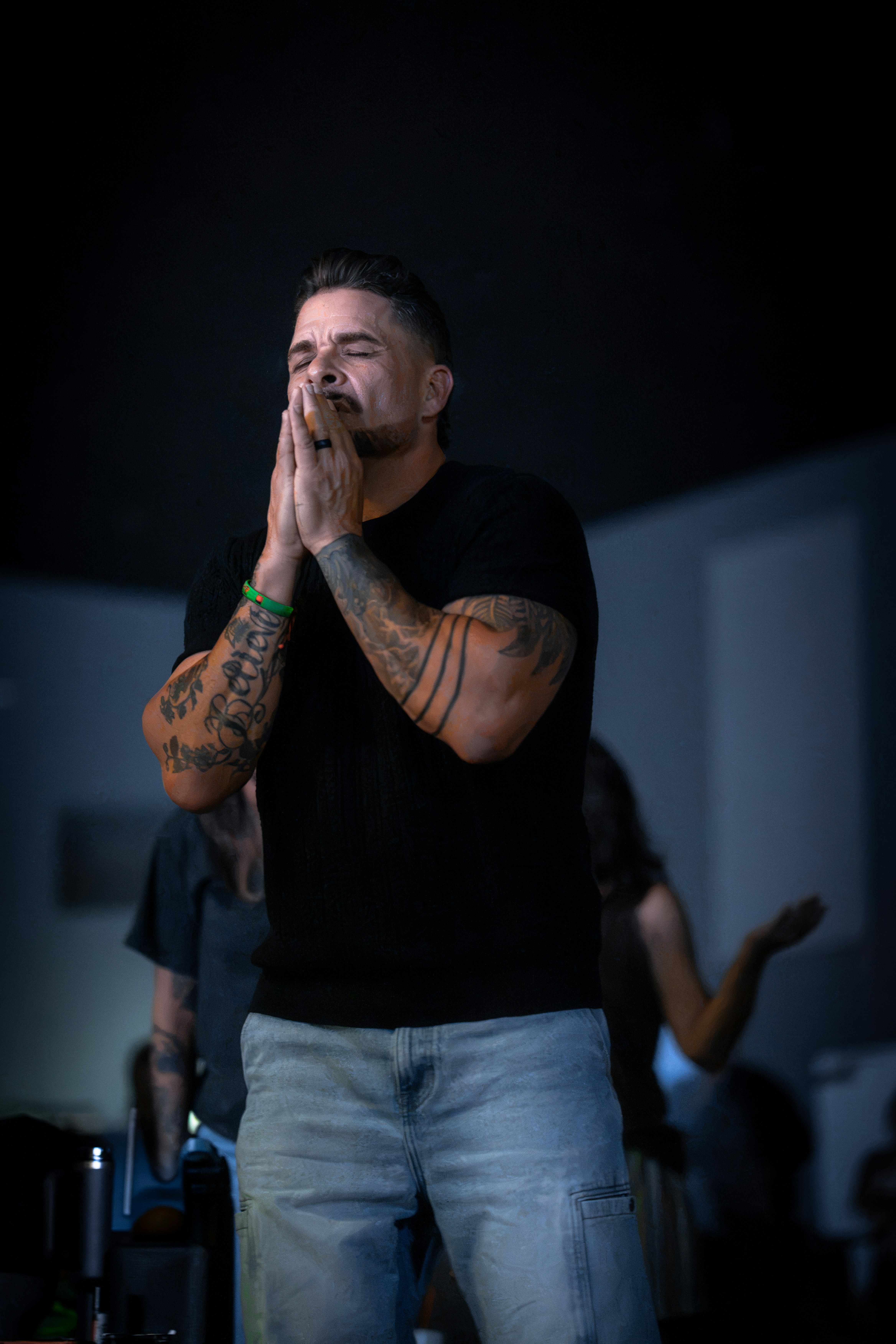 Moment of Quiet Power: Hands Clasped in a Prayerful Pause