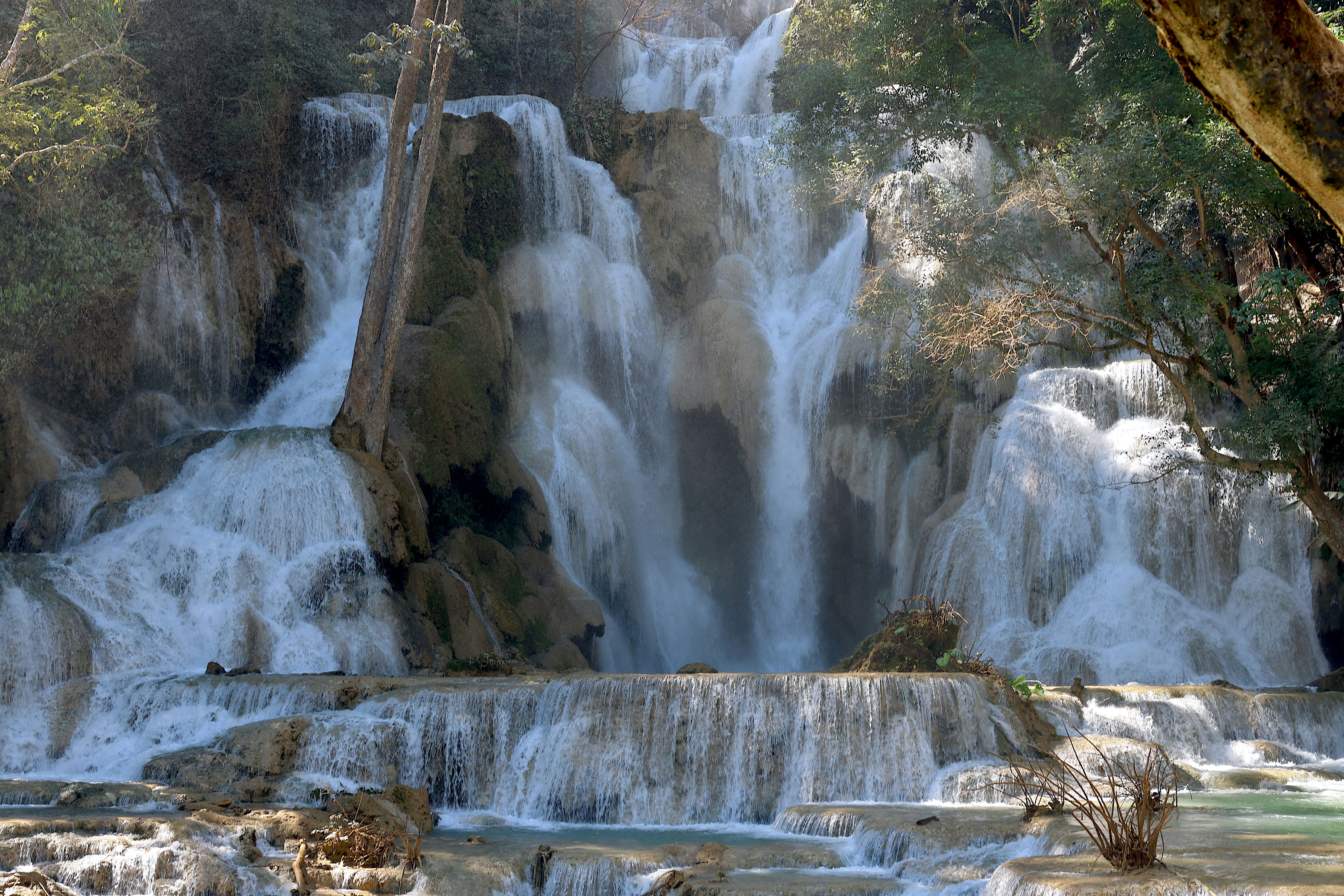 Cascade Echoes: A Multilayered Shroud of Water and Stone