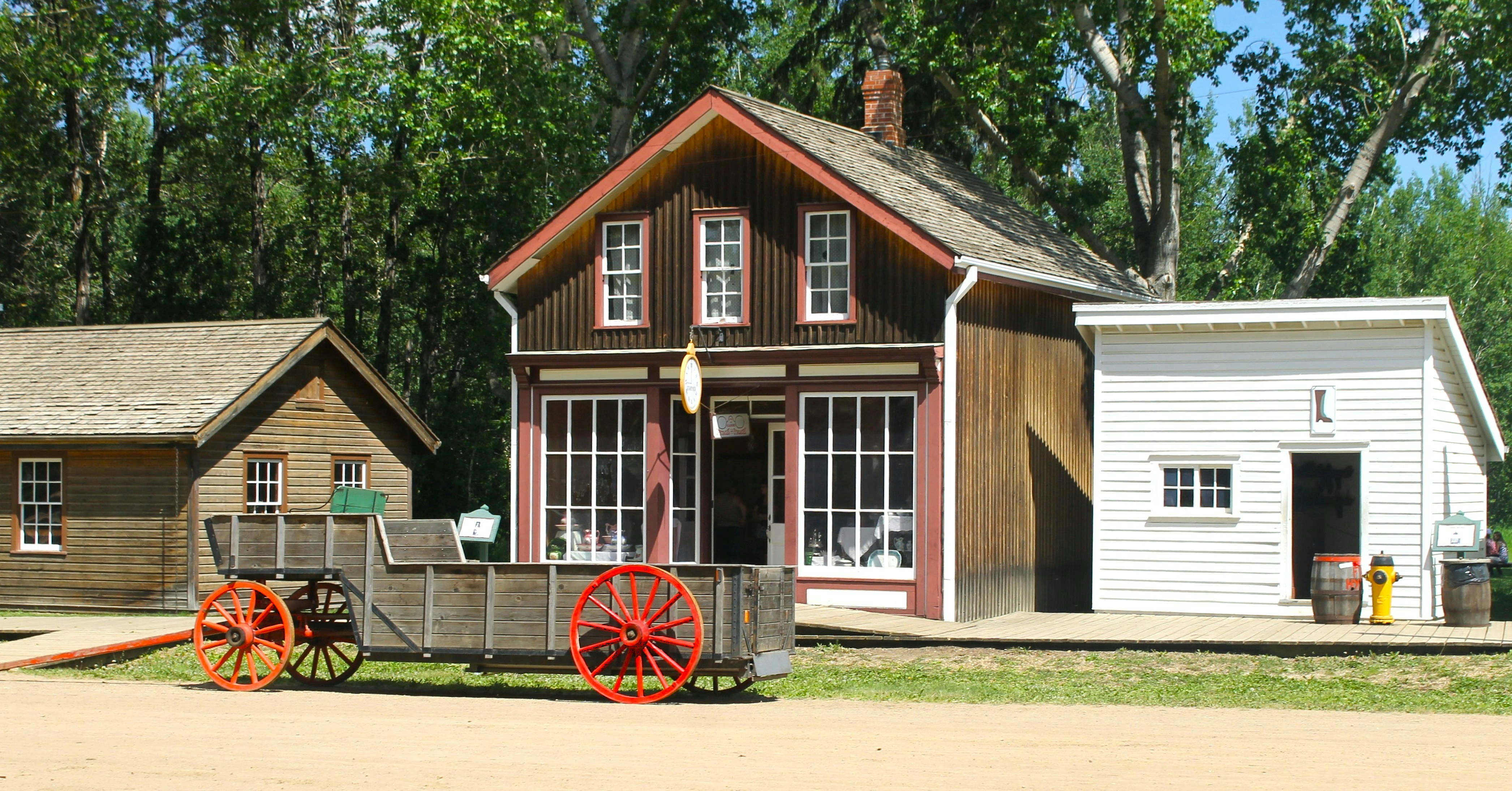 Village Wagon and Weathered Storefront in Quiet Farmstead