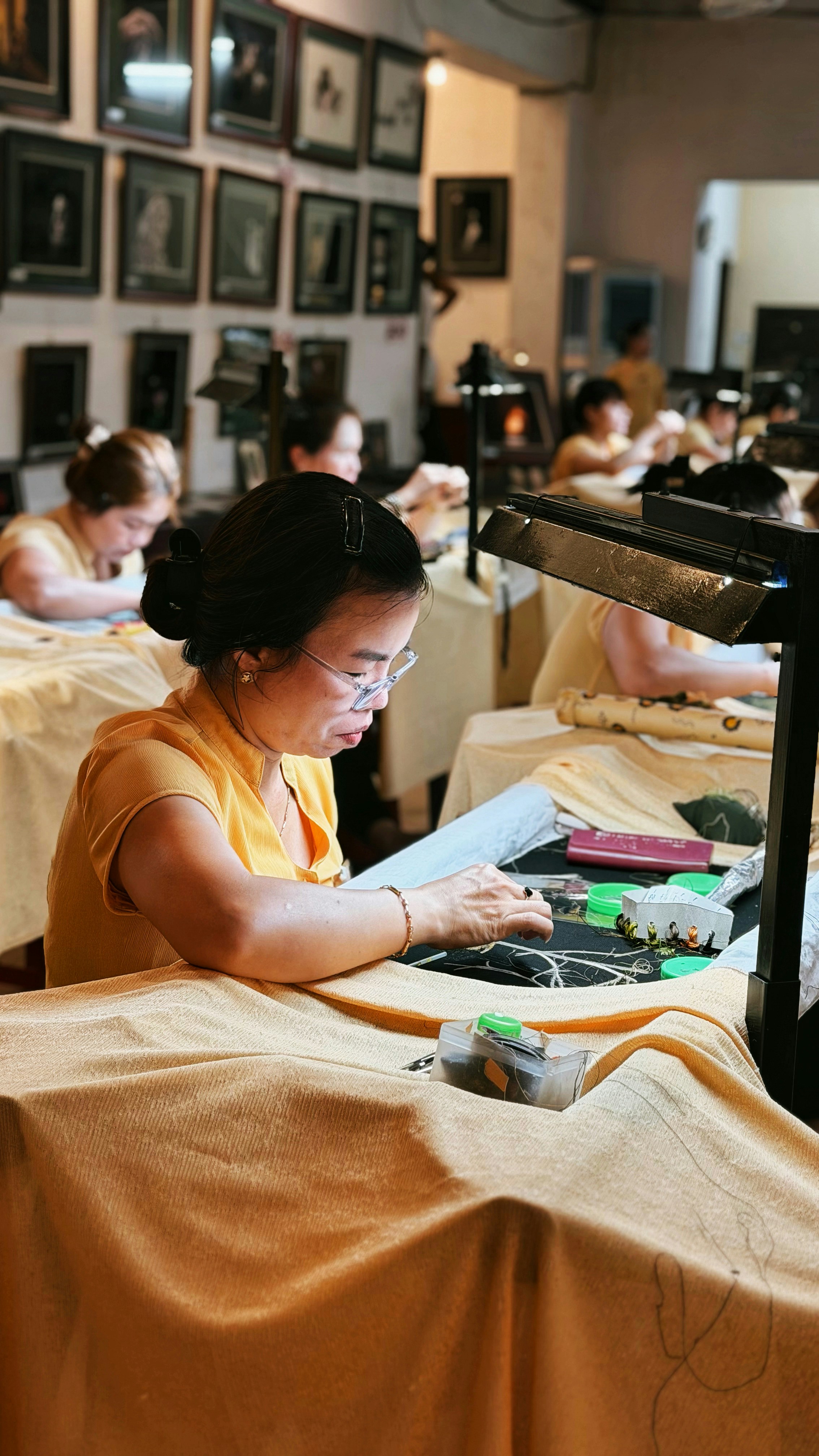 Focused Craft: A Needleworker in a Sunlit Studio