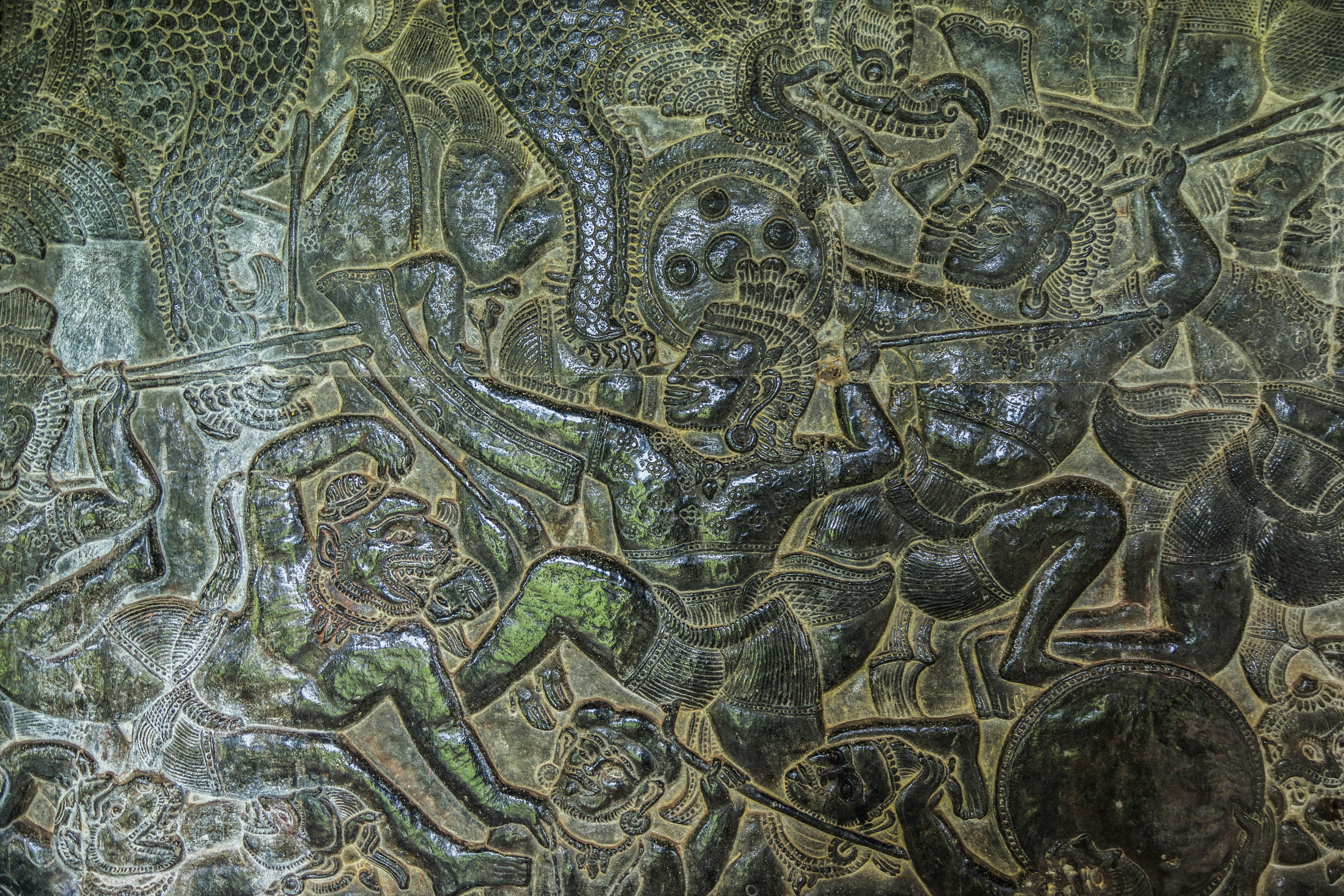 Ancient Carved Chronicle: Dynamic Combat Scene in Bas-Relief