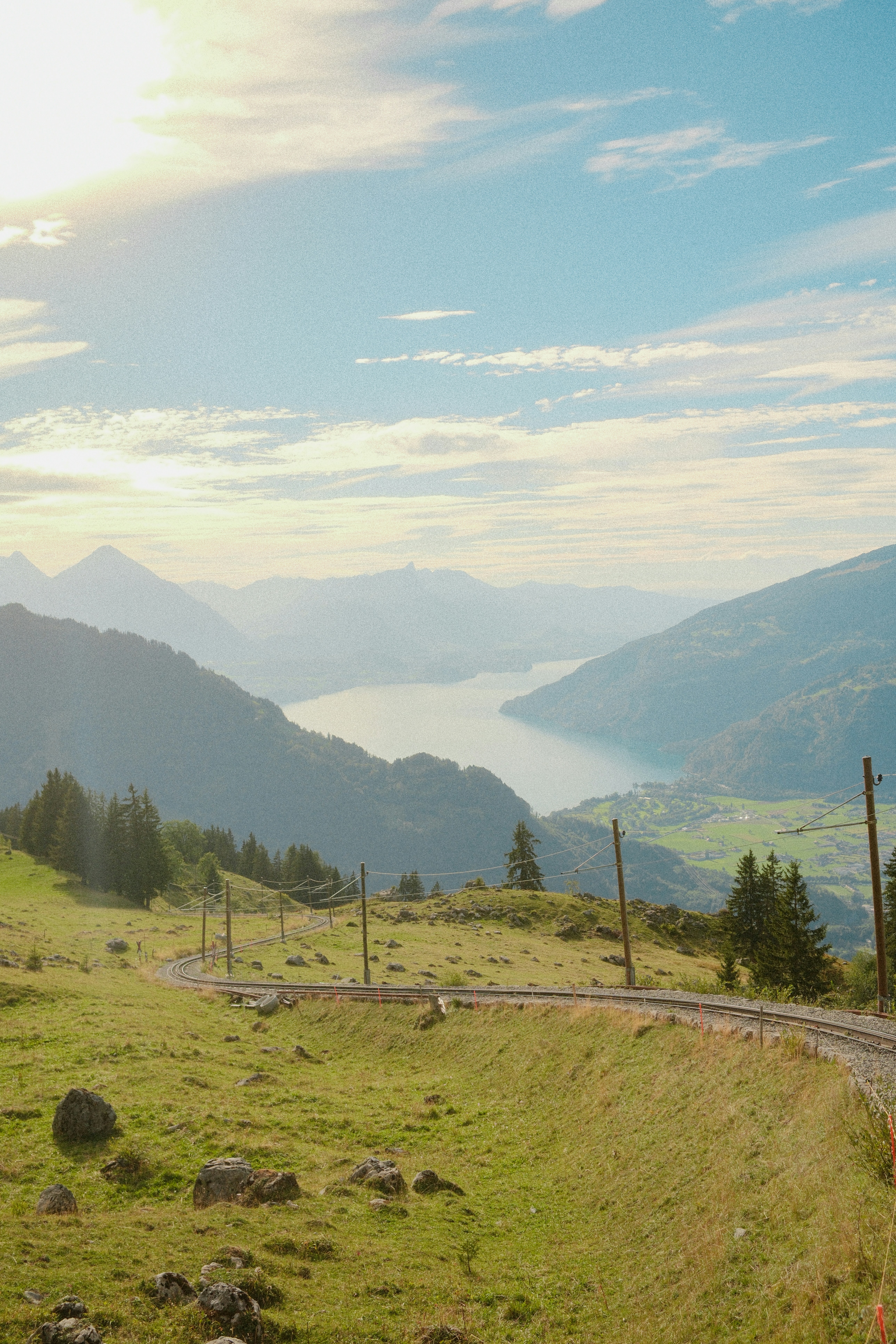 Sunny Ridge Overlooking a Serene Alpine Valley