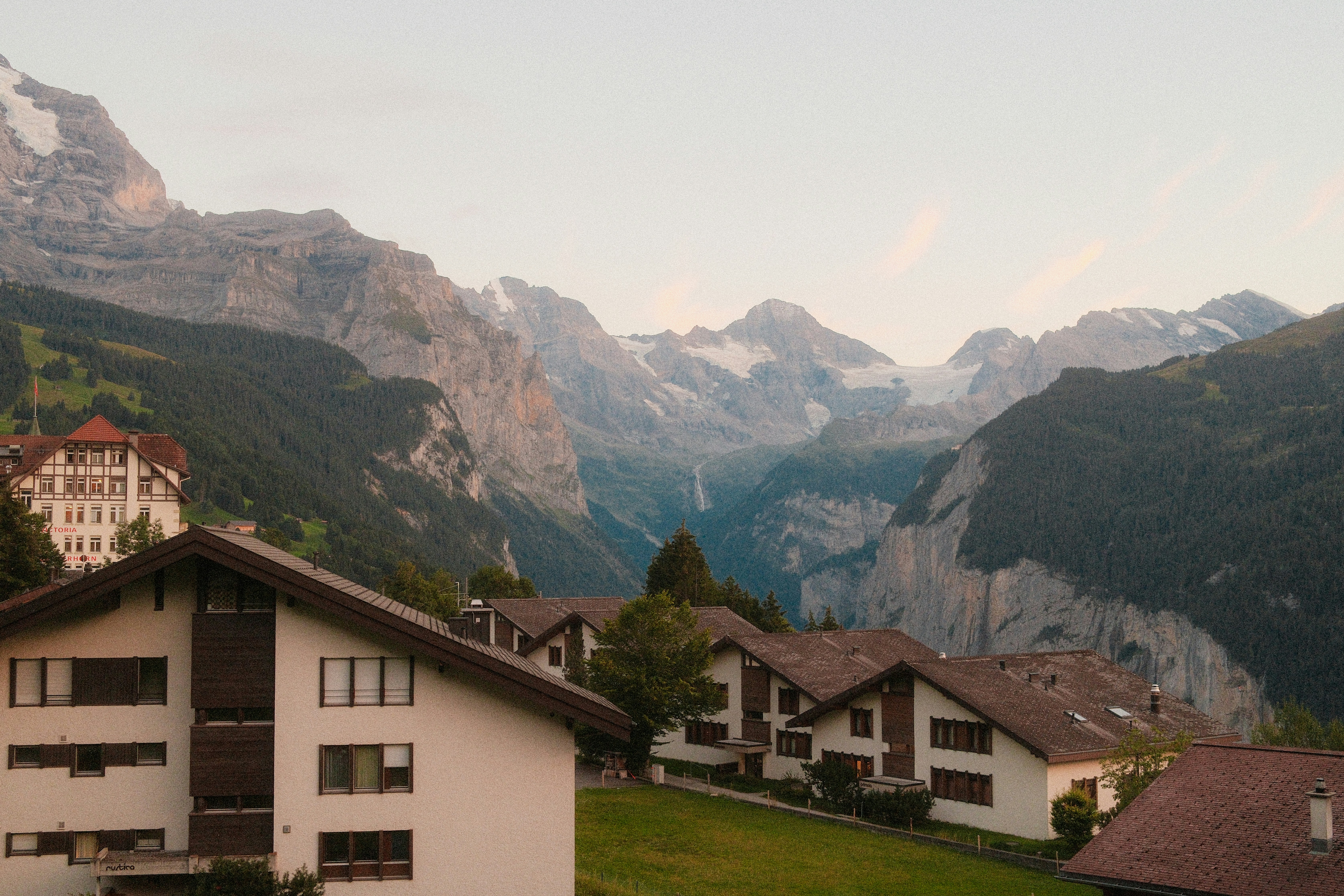Alpine Village Beneath Echoes of a Distant Peak