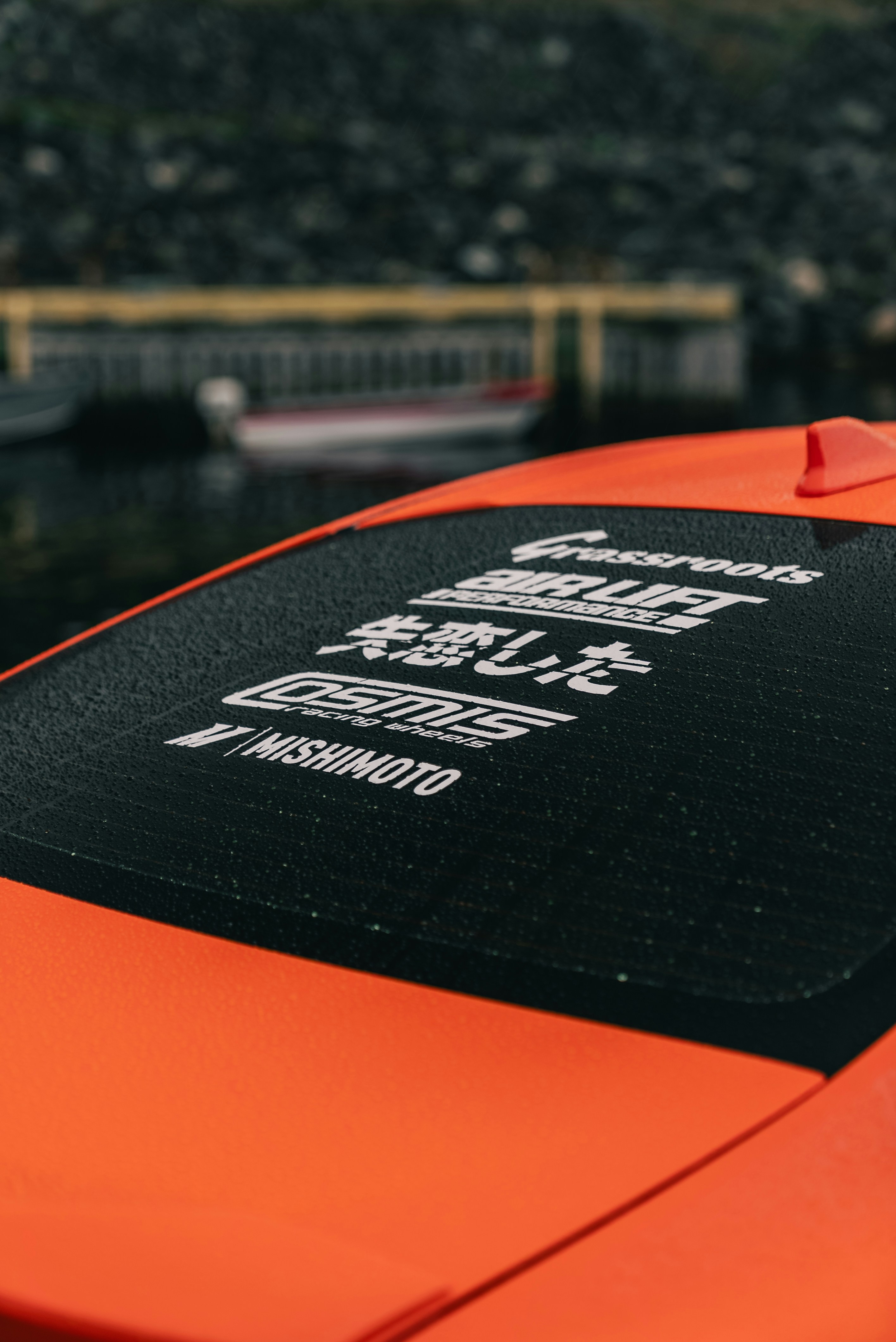 Orange Hydration: The Car Hood Holds Quiet Branding
