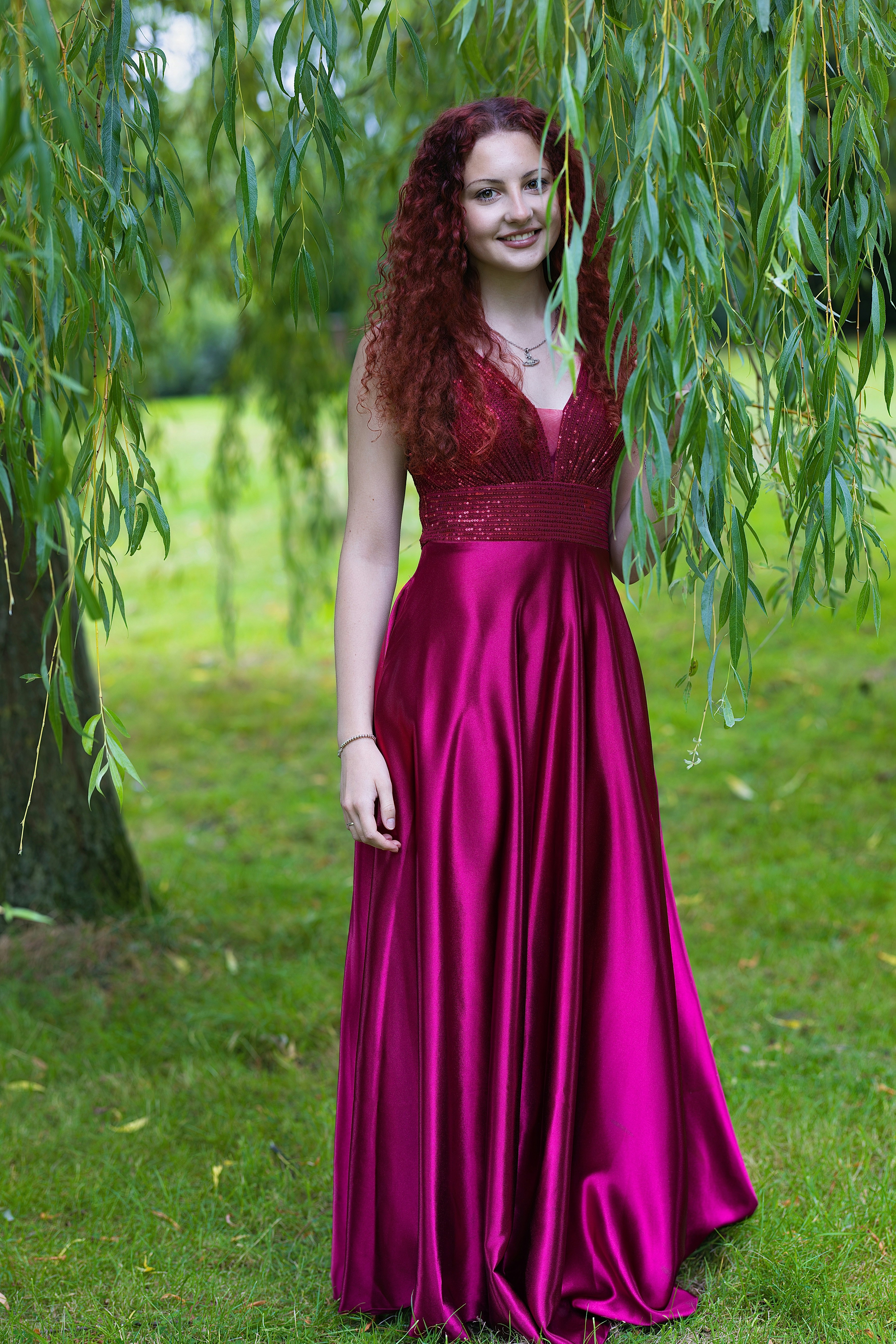 Emerald Canopy: A Velvet Gown Under Willow Tresses