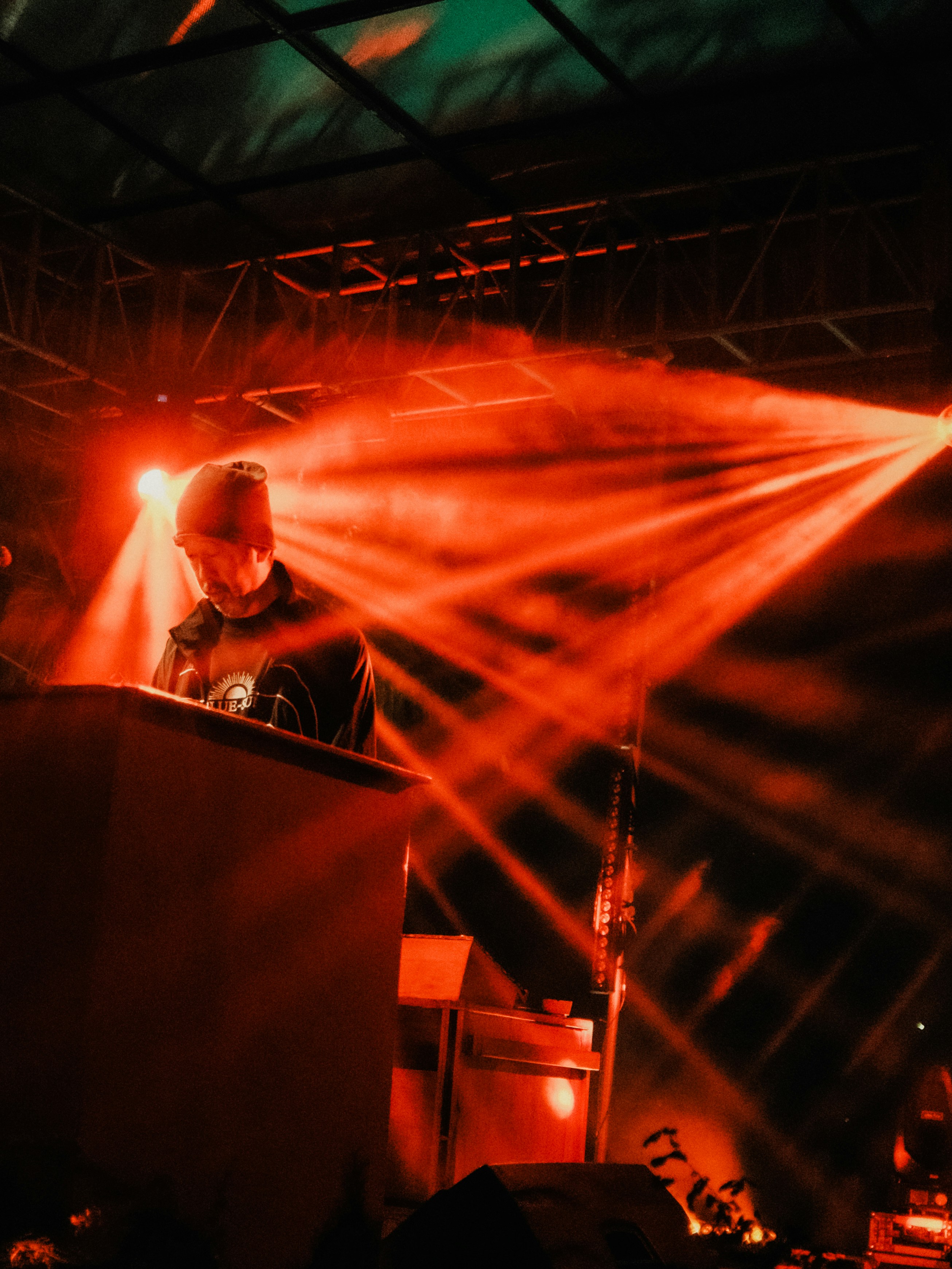 Red Rift: A DJ in Nebulous Stage Lights