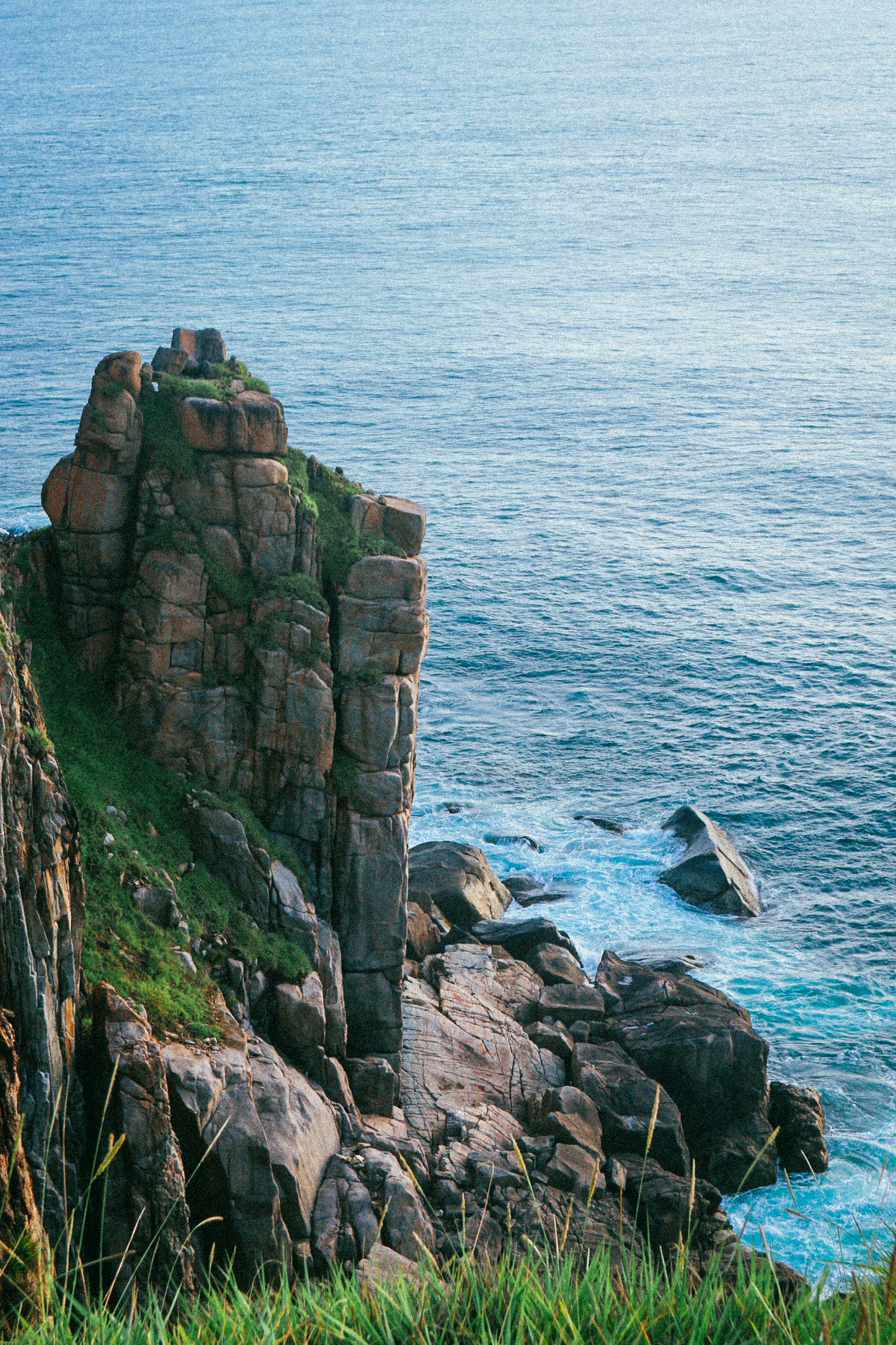 Cliff Tower Reaching Toward the Sea