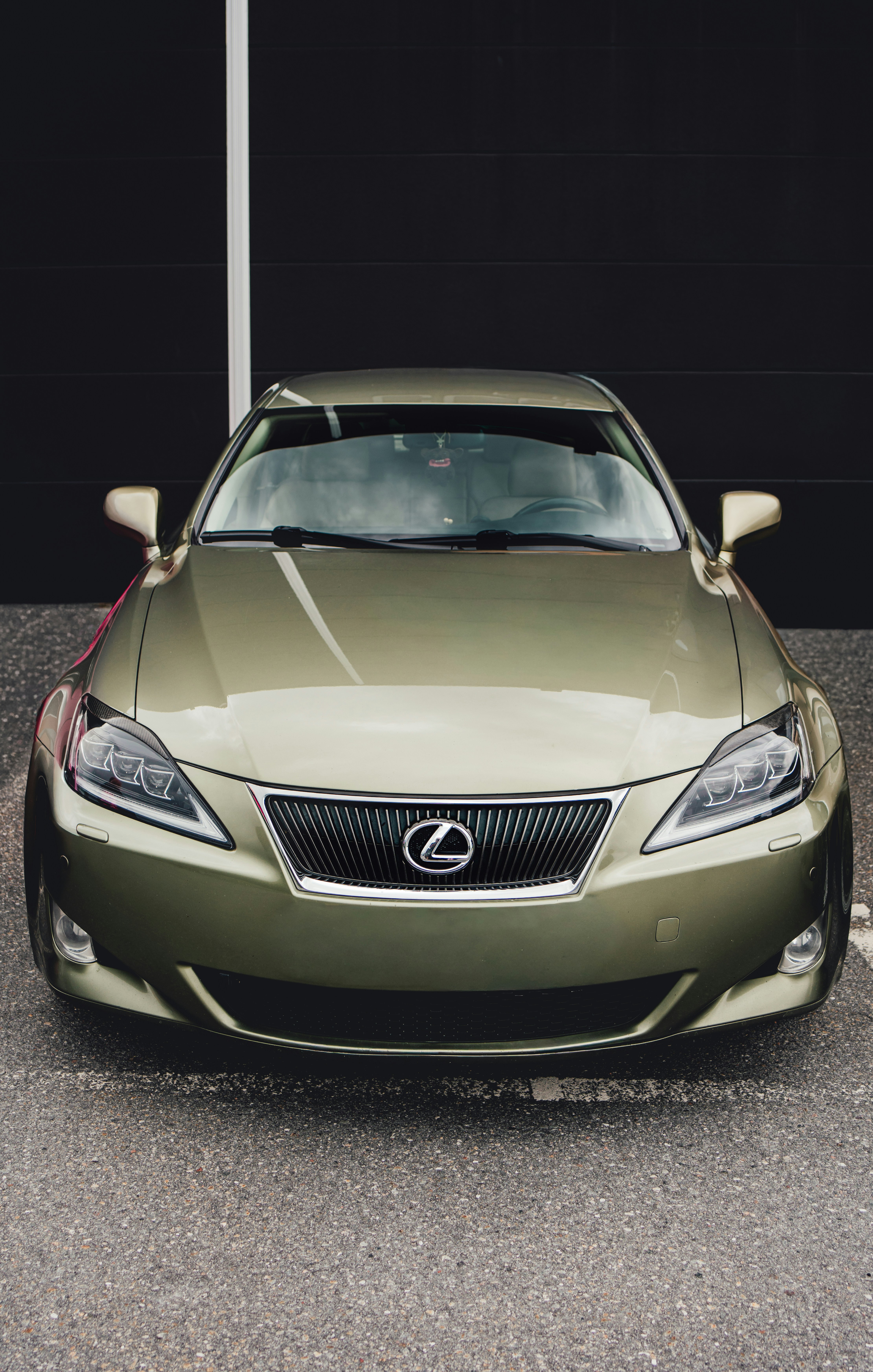Luxe Olive Lexus: Front-and-Center in a Modern Facade